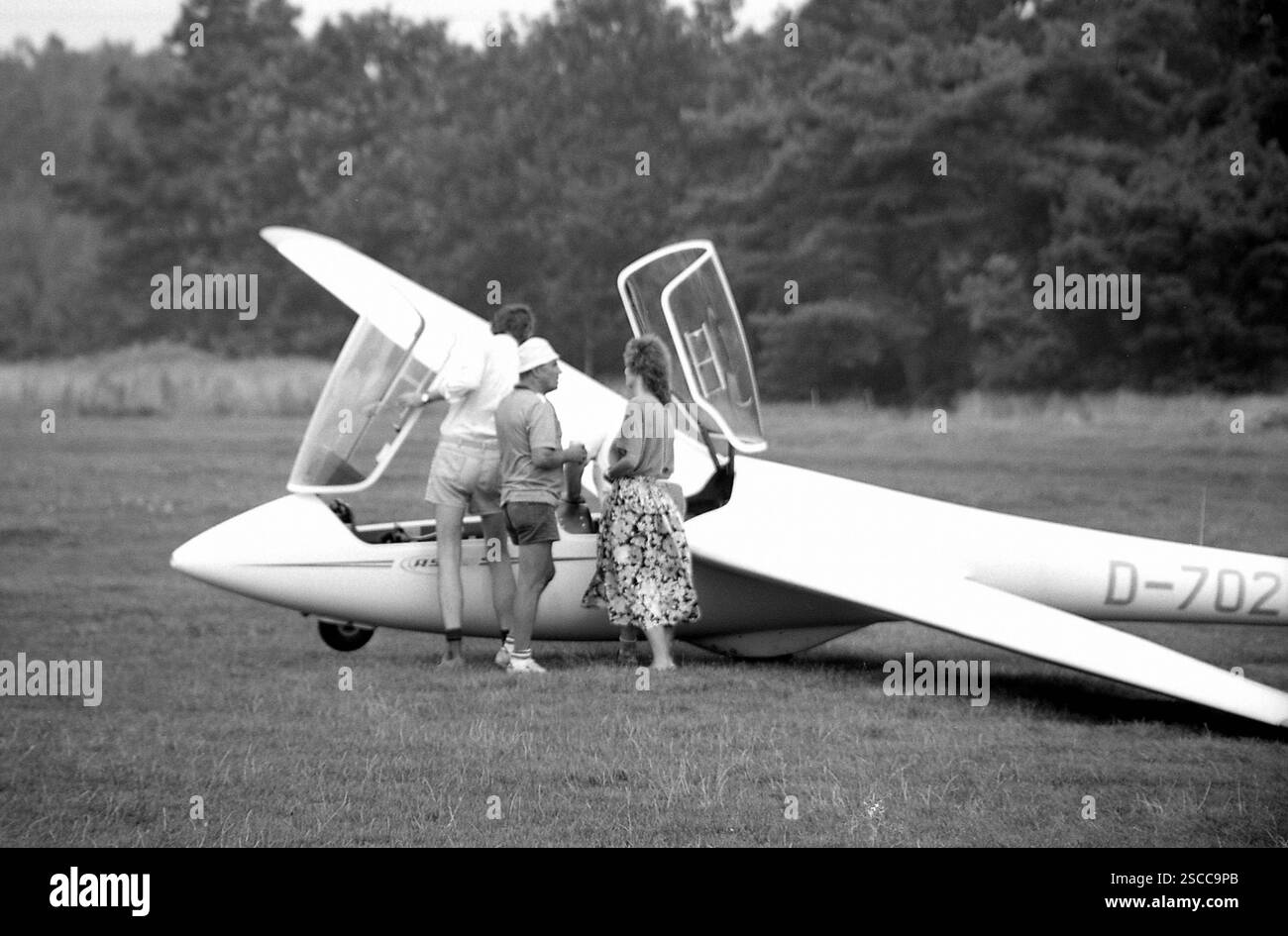 Airfield Stuede: Picture shows men and woman in front of a Alexander ...