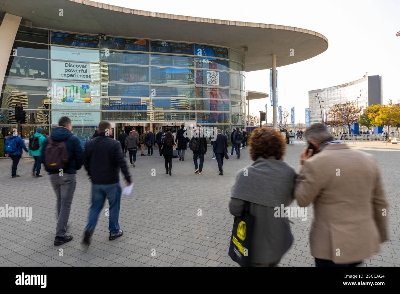 ISE 2025 (Integrated Systems Europe). Attendees on the main entrance during ISE 2025 in Gran Via ...