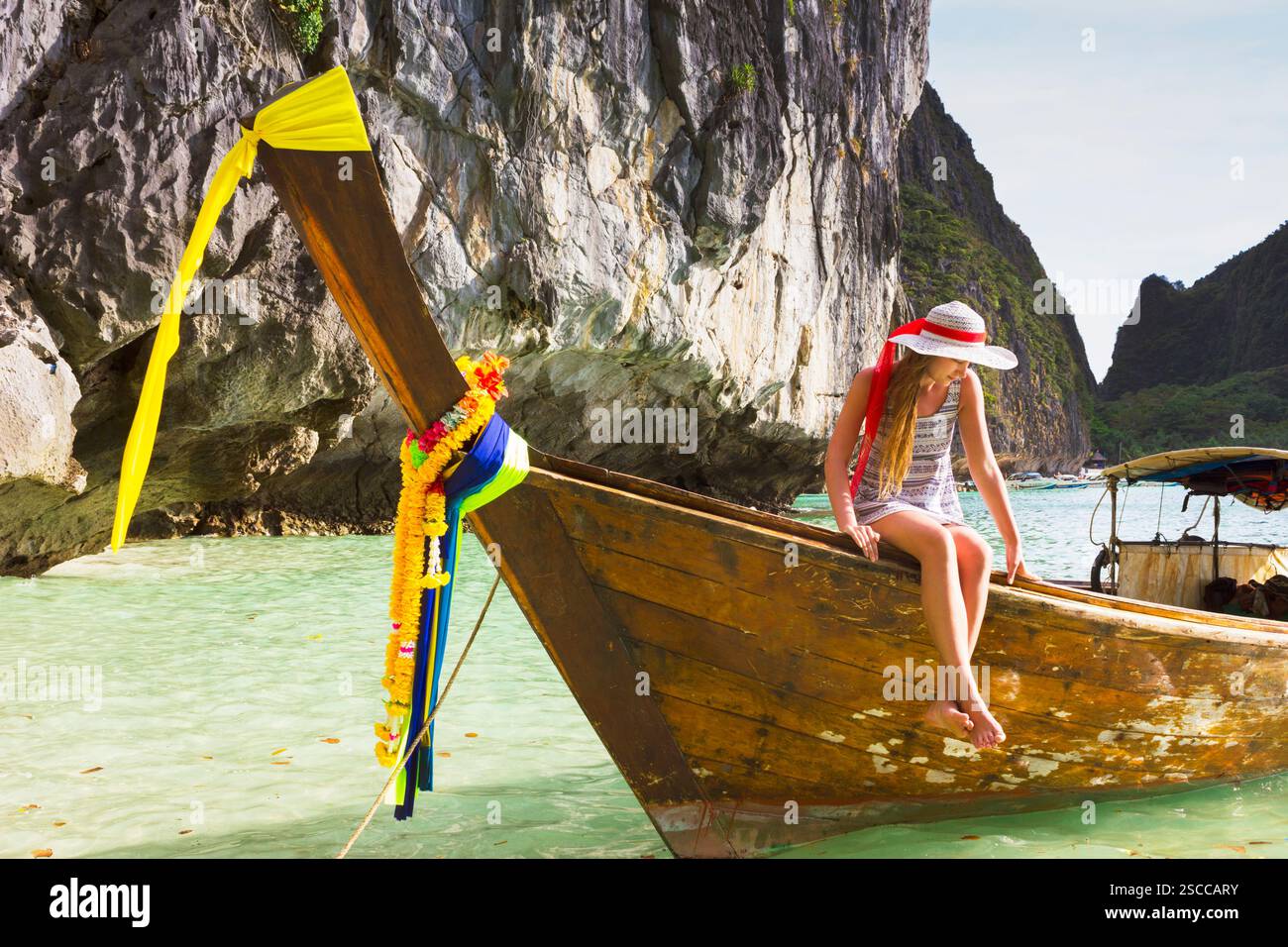 Girl on a boat at a resort in Thailand Stock Photo - Alamy