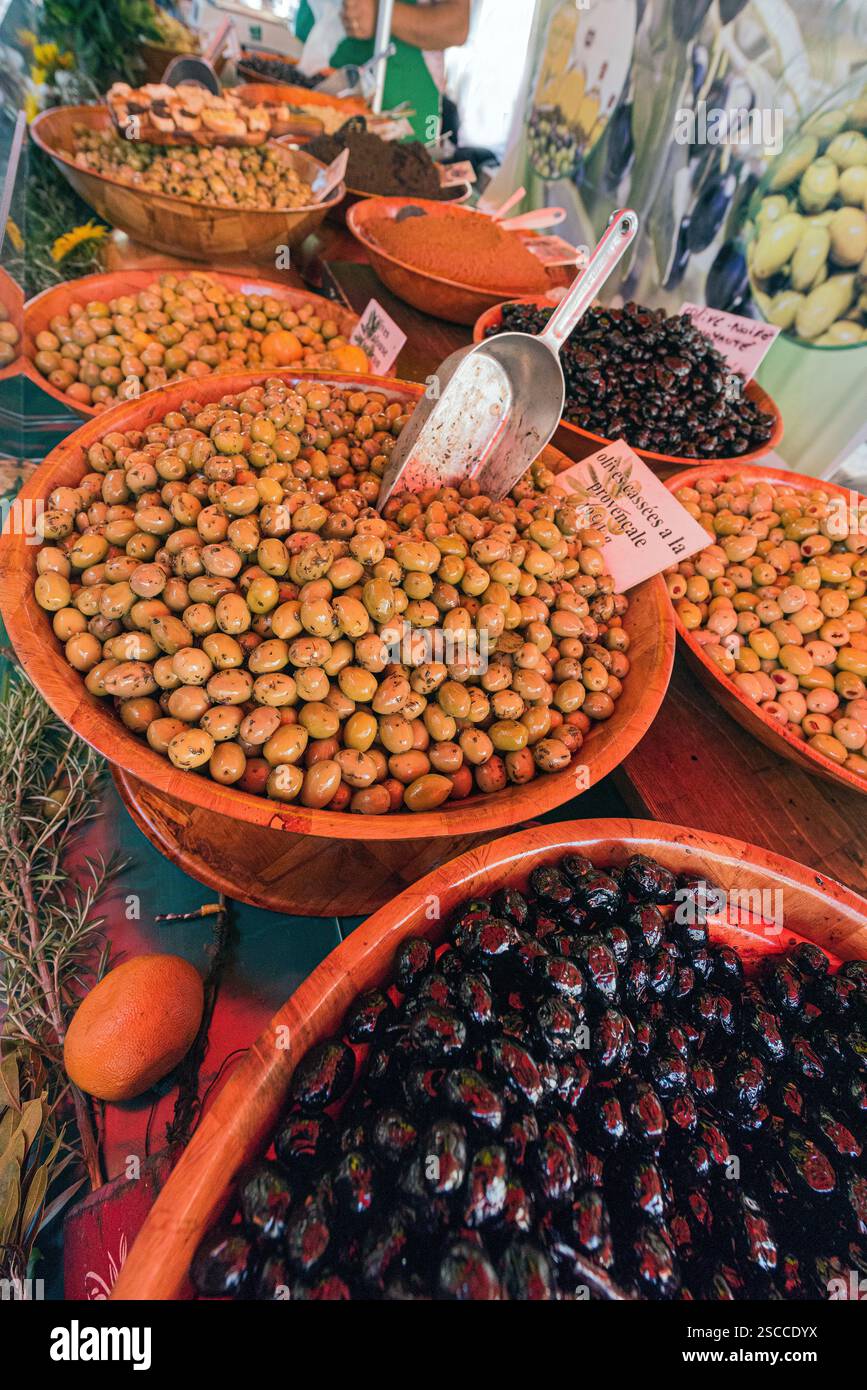 Olives for sale at the market of St Rémy de Provence. Buches du Rhone ...