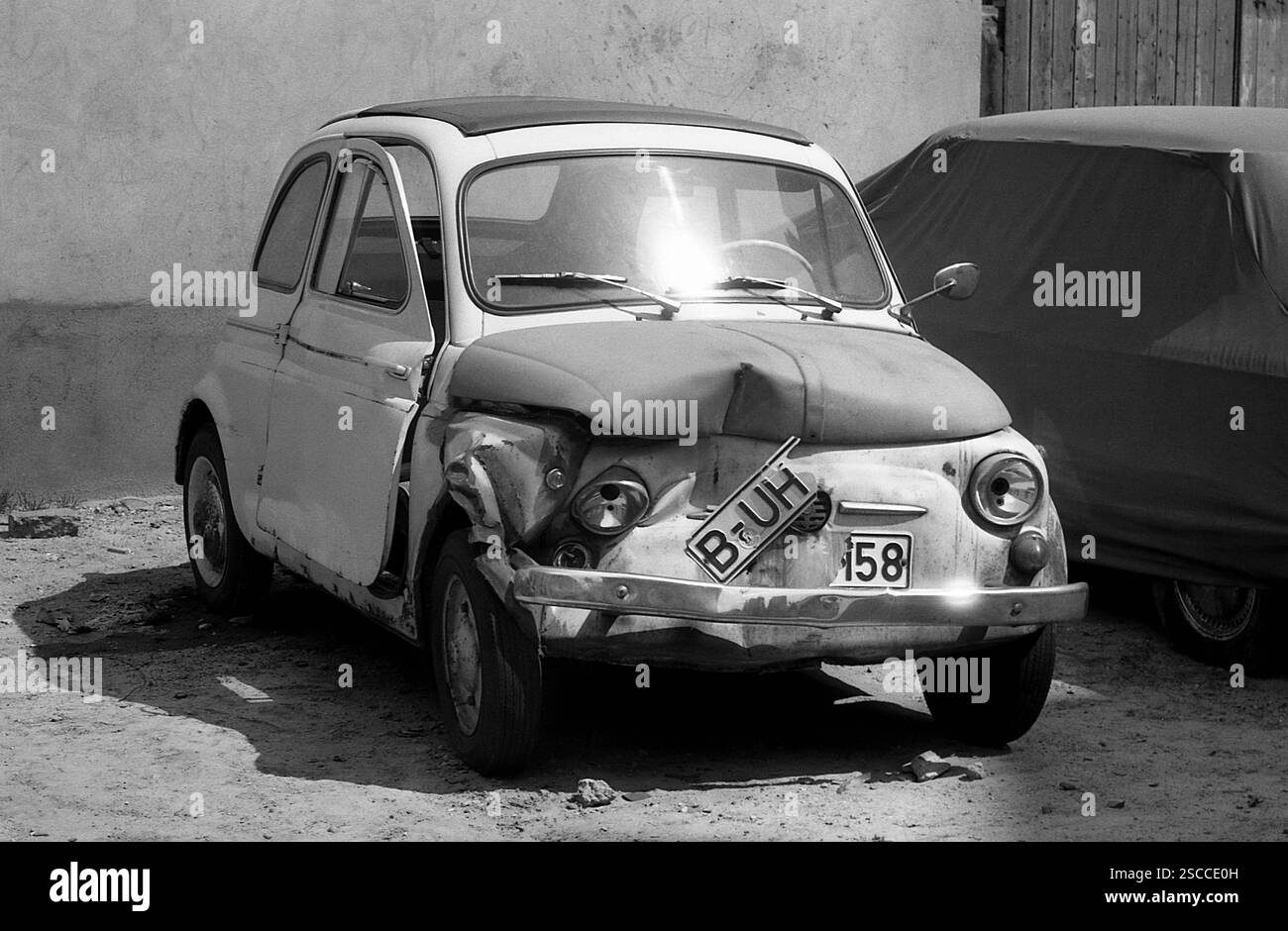 Wrecked Fiat 500 in Berlin Stock Photo - Alamy