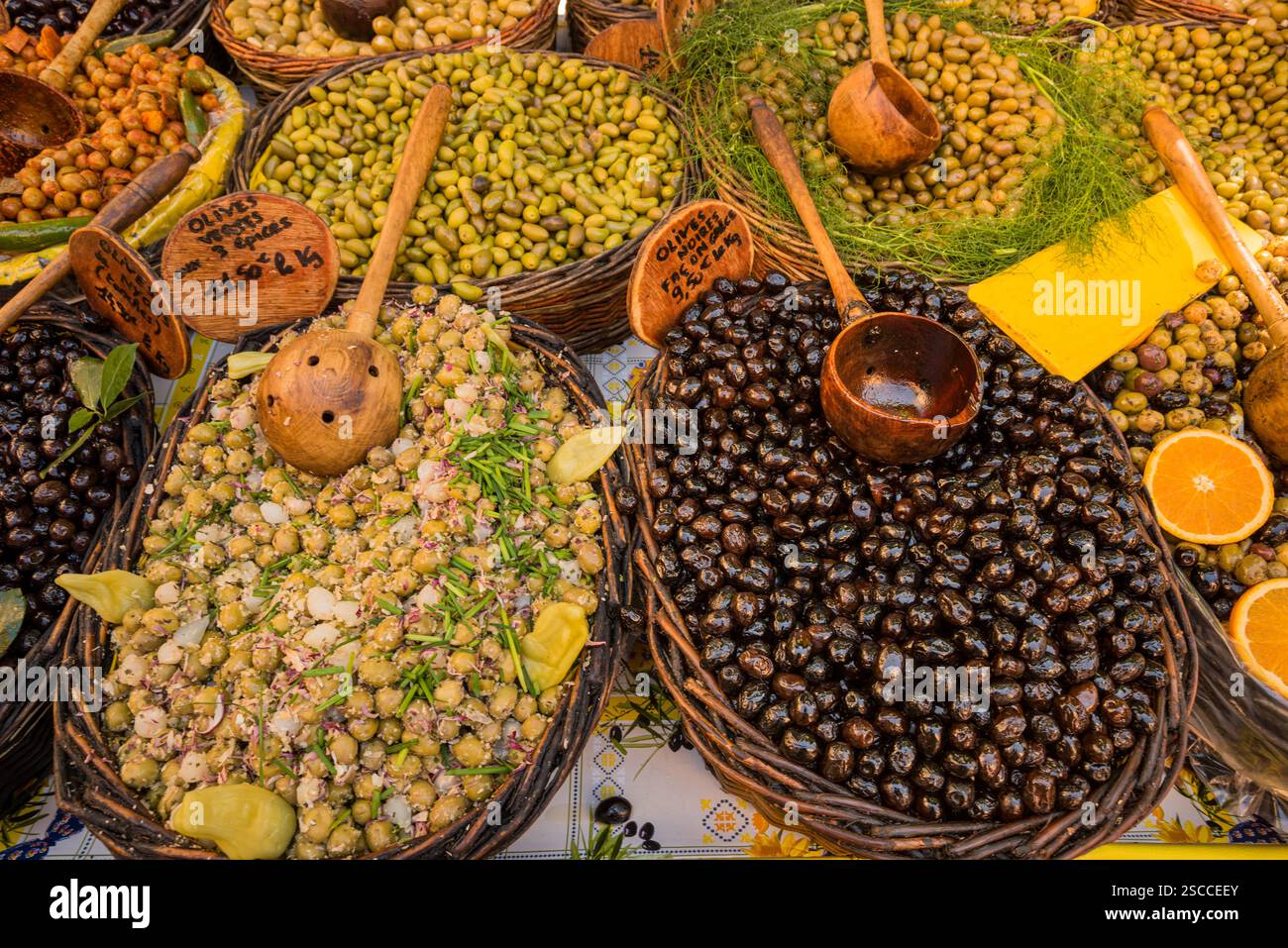 Olives for sale at the market of St Rémy de Provence. Buches du Rhone ...