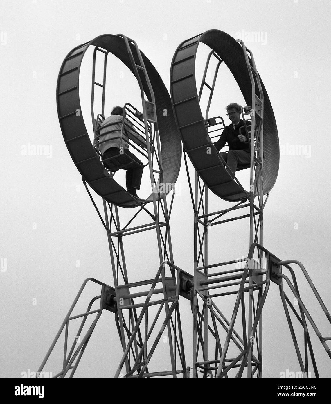 Playground Harderwijk in Amsterdam. Picture shows men in a swing Stock ...
