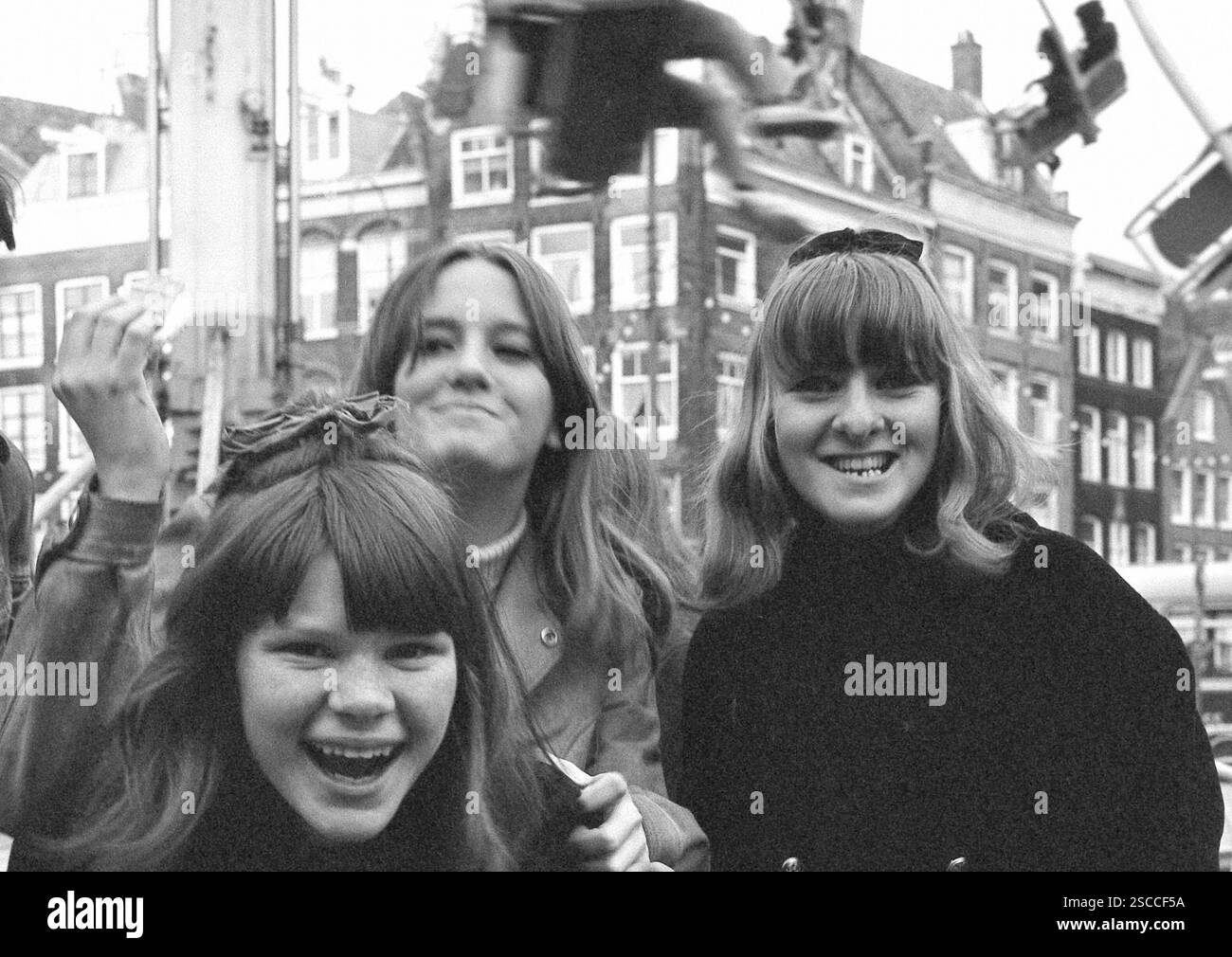 Girls on a fair in Amsterdam. Picture shows laughing youths and in the ...