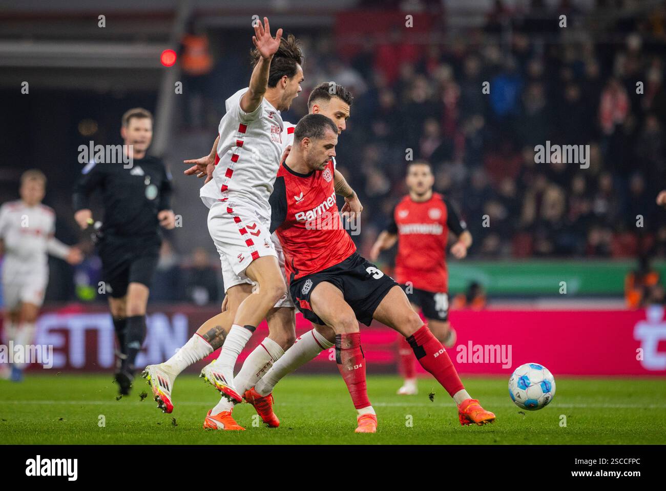 Leverkusen, Germany. 05th Feb 2025. Granit Xhaka (LEV) Max Finkgräfe (Köln) Dejan Ljubicic (Köln ...