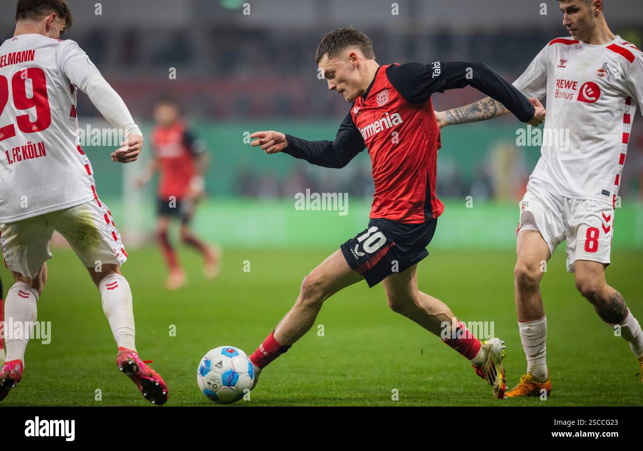 Leverkusen, Germany. 05th Feb 2025. Florian Wirtz (LEV) Jan Thielmann (Köln) Denis Huseinbasic ...