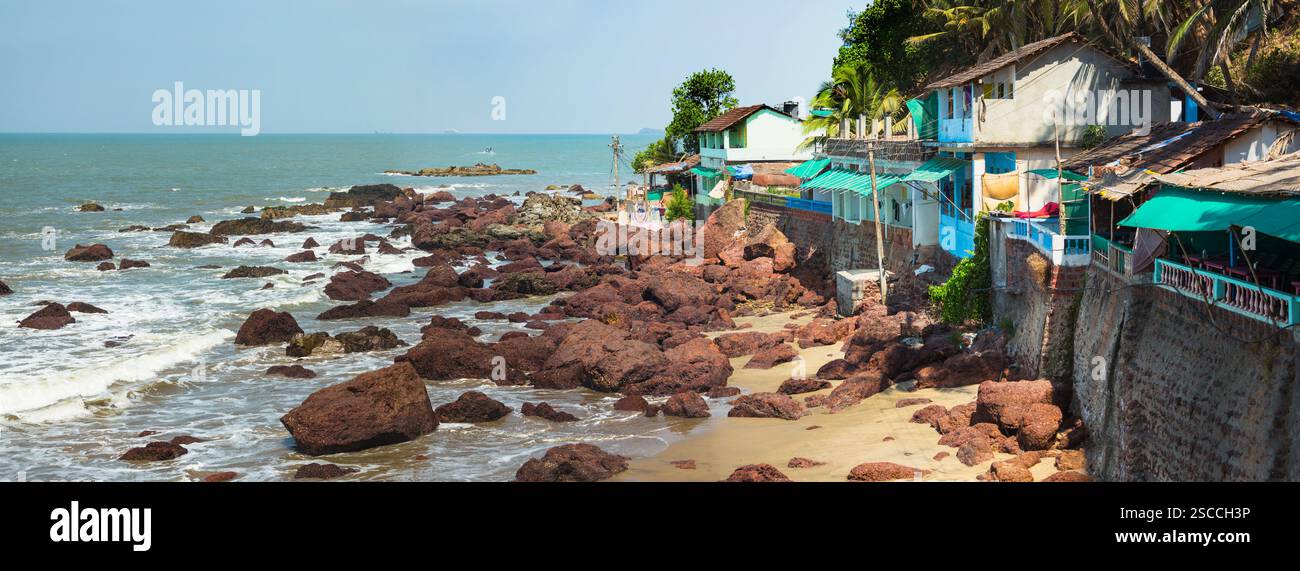 Arambol beach, stones, houses, North Goa, India Stock Photo - Alamy