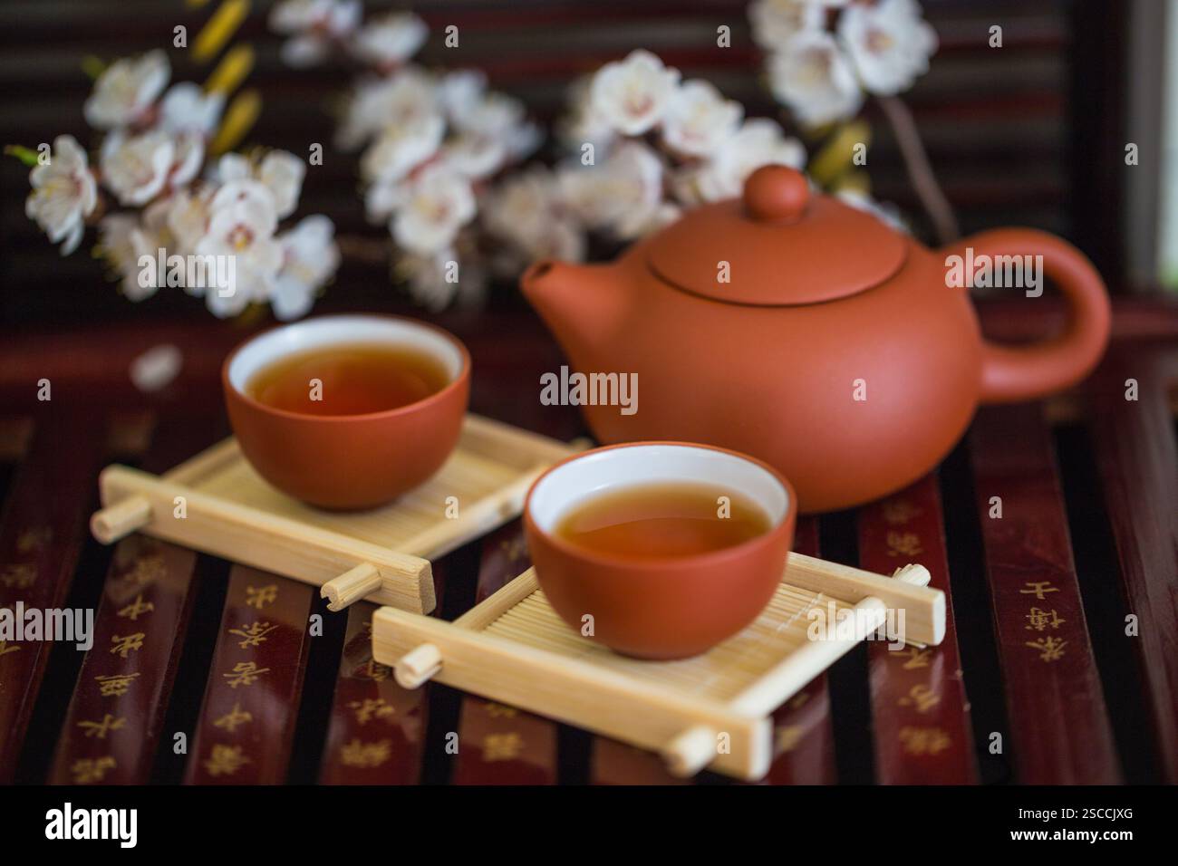Ancient Chinese tea set with spring flowers Stock Photo - Alamy