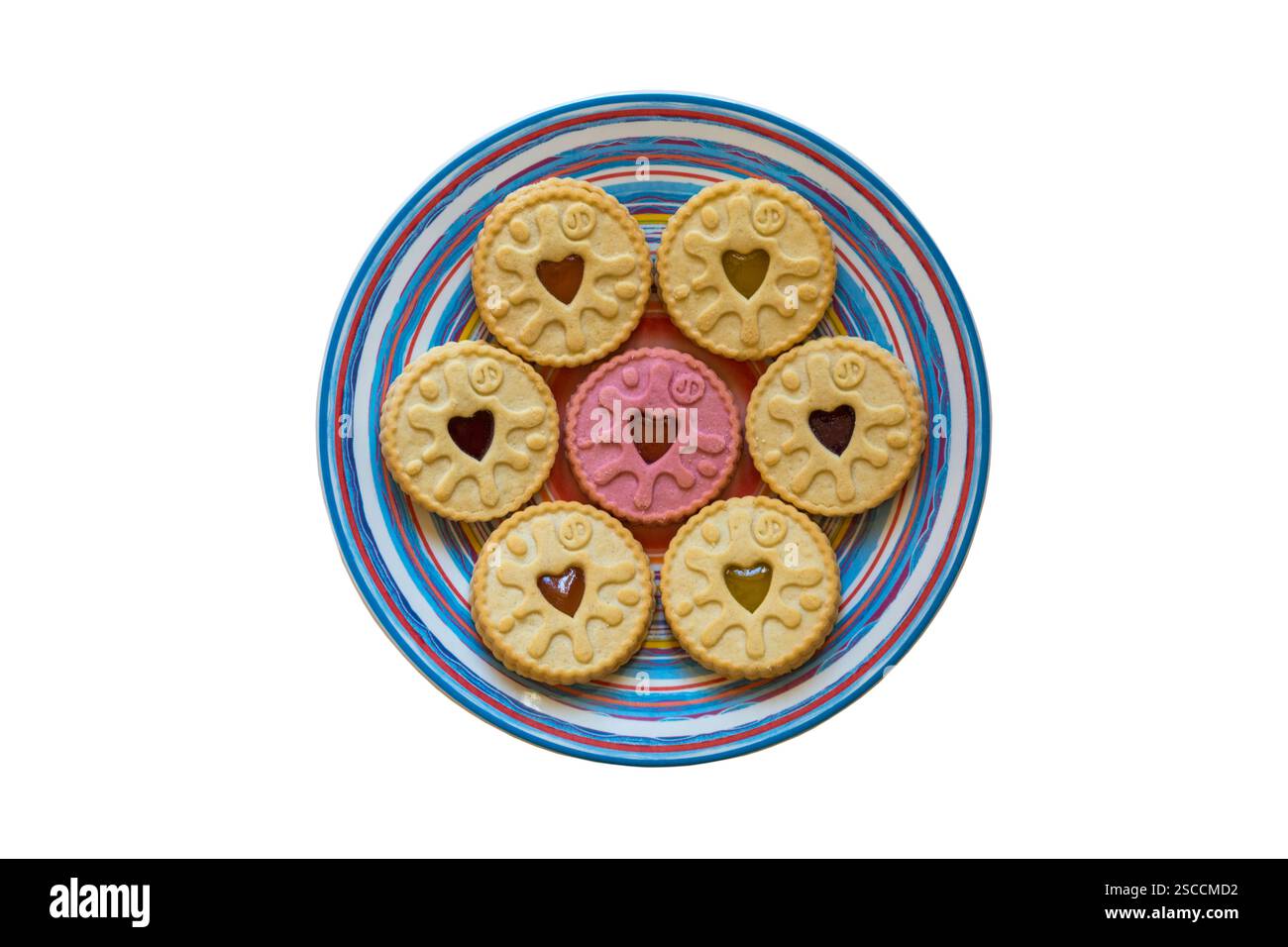Jammie Dodgers biscuits of various flavours on plate isolated on white ...