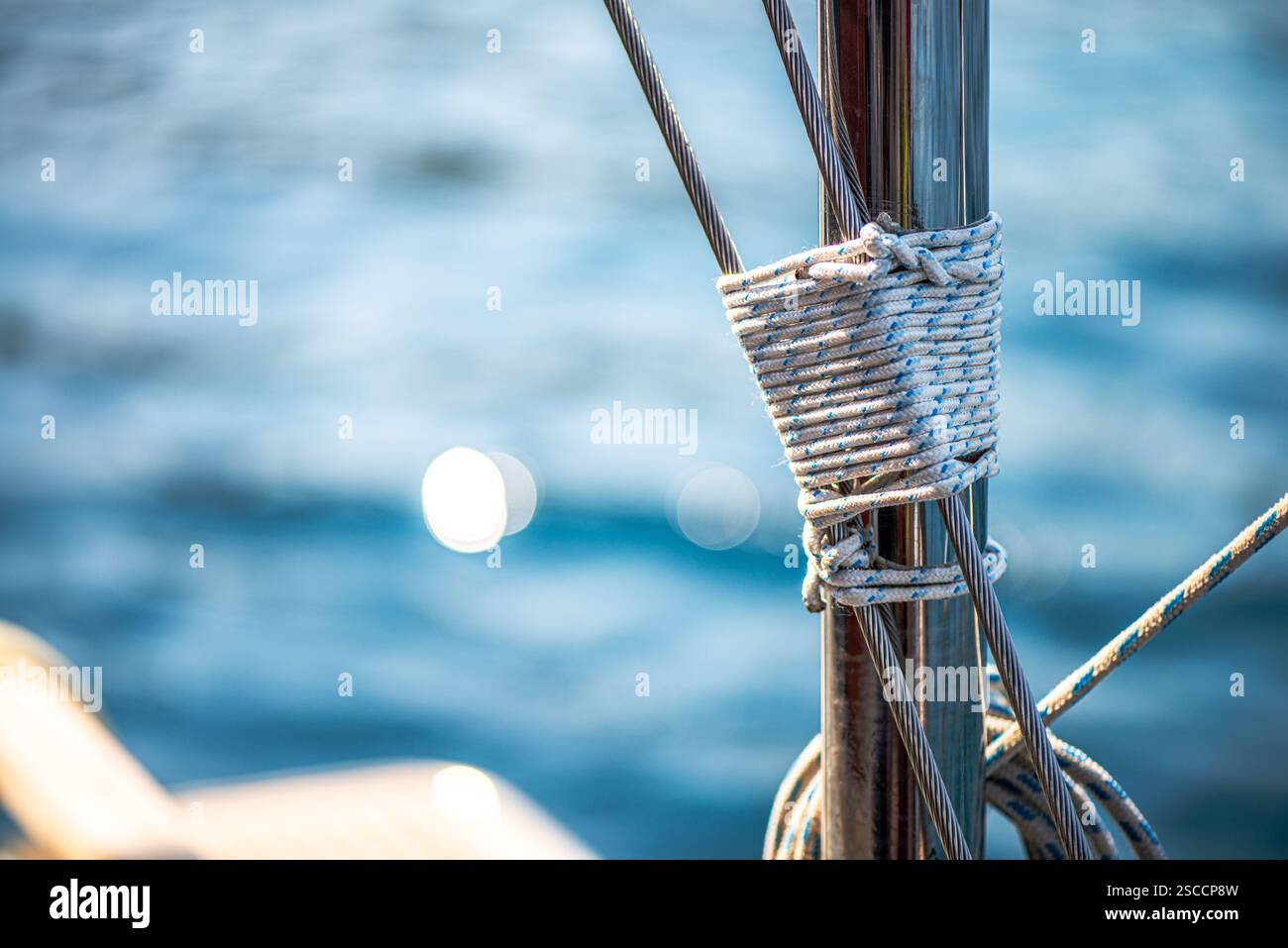 A detailed macro view of a ship’s rope and winch, capturing the ...