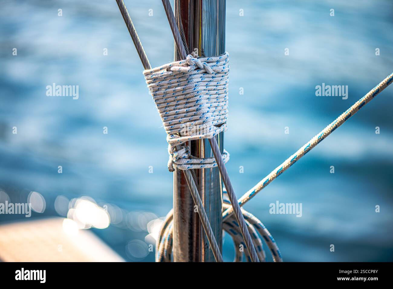 A detailed macro view of a ship’s rope and winch, capturing the ...