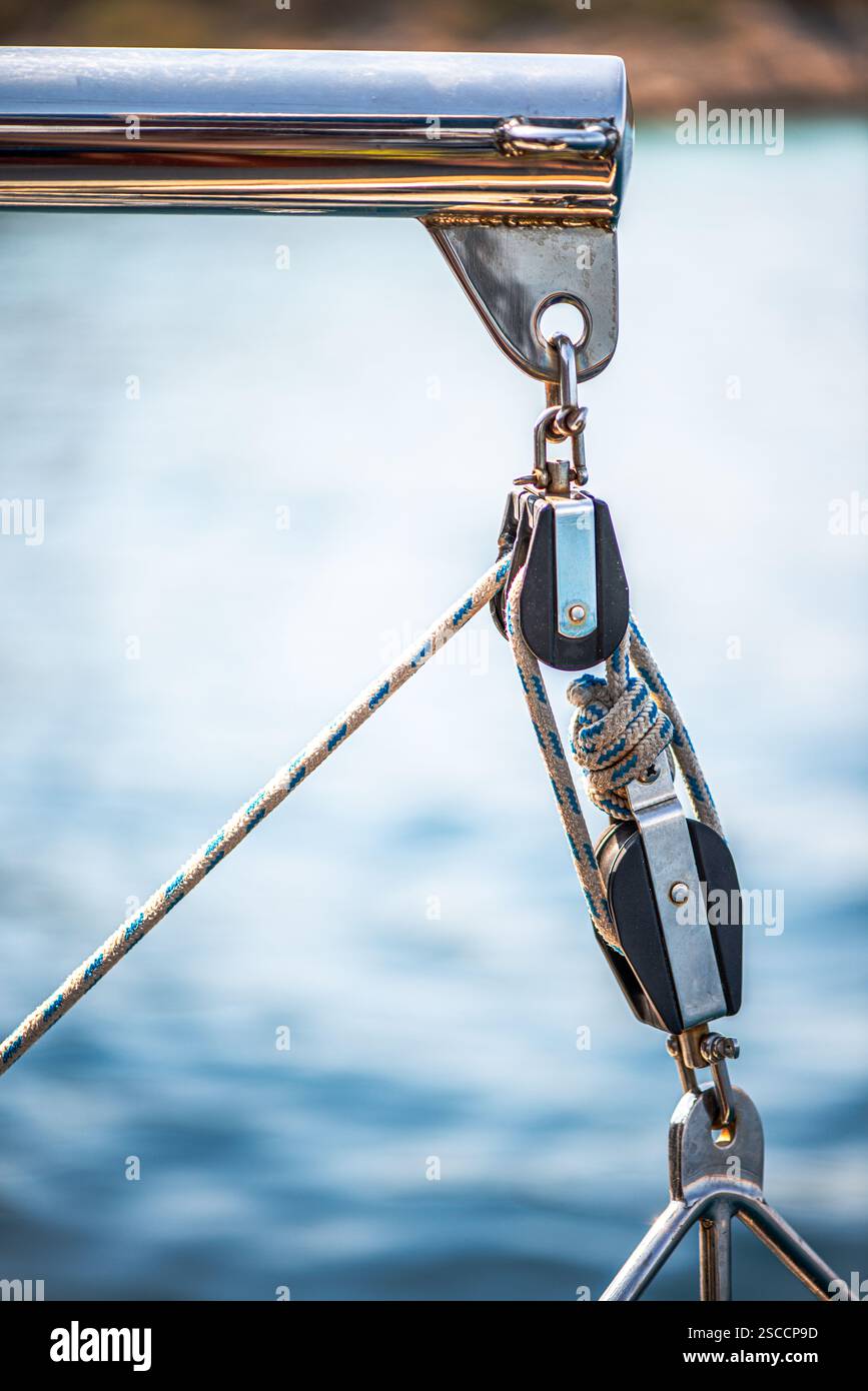 A detailed macro view of a ship’s rope and winch, capturing the ...