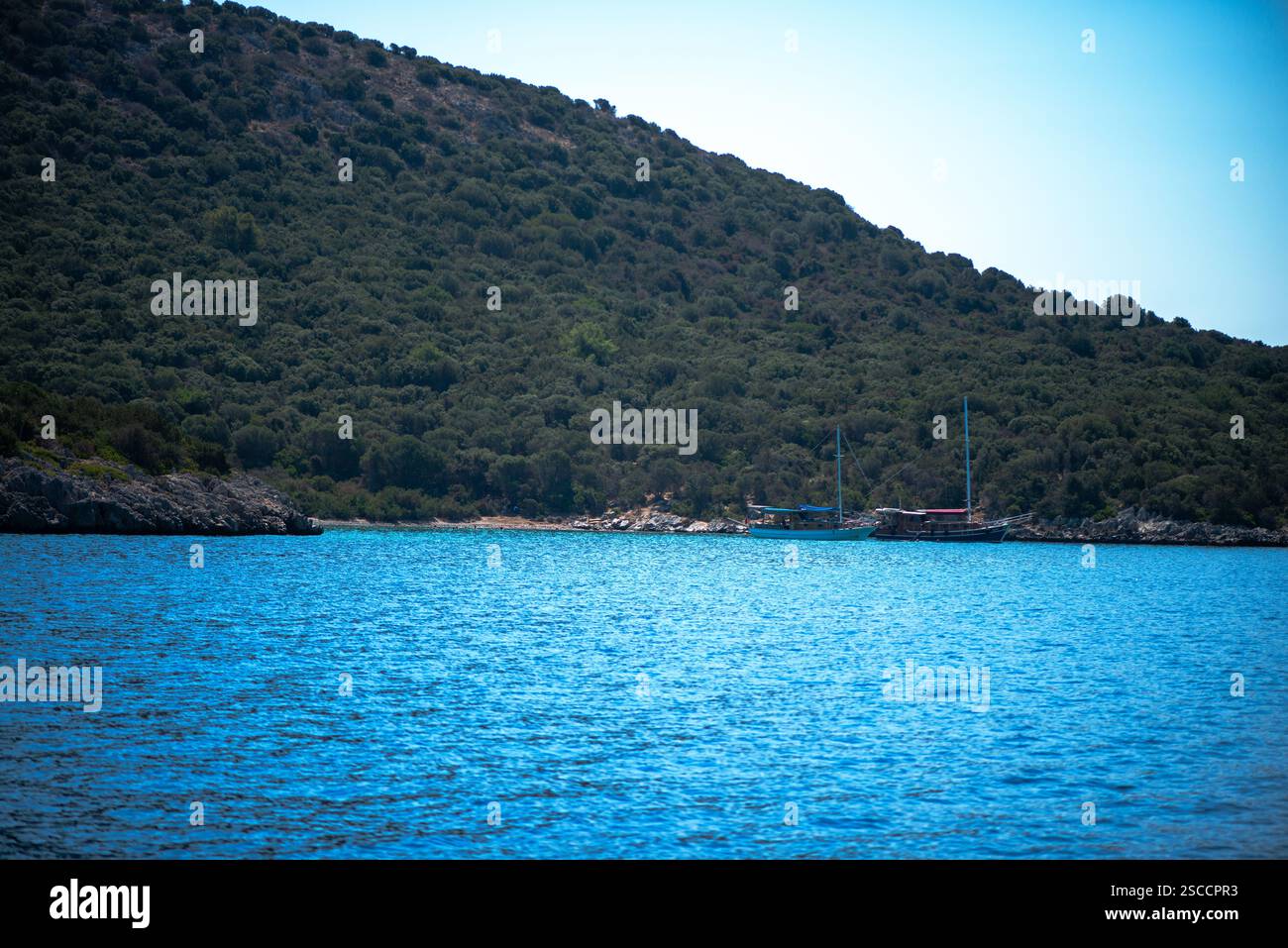 A serene blue sea setting featuring key ship components, including ...