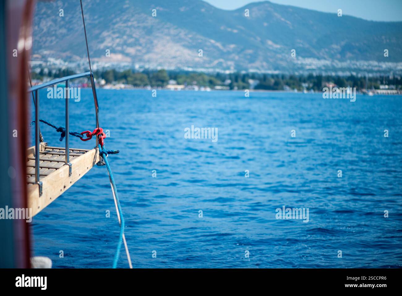A serene blue sea setting featuring key ship components, including ...