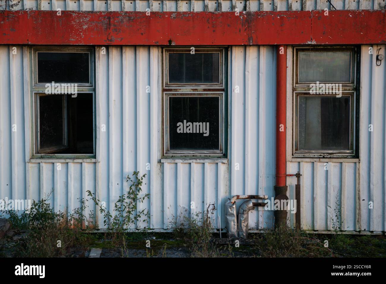 Industrial abandoned building with windows, old bakery building made of ...