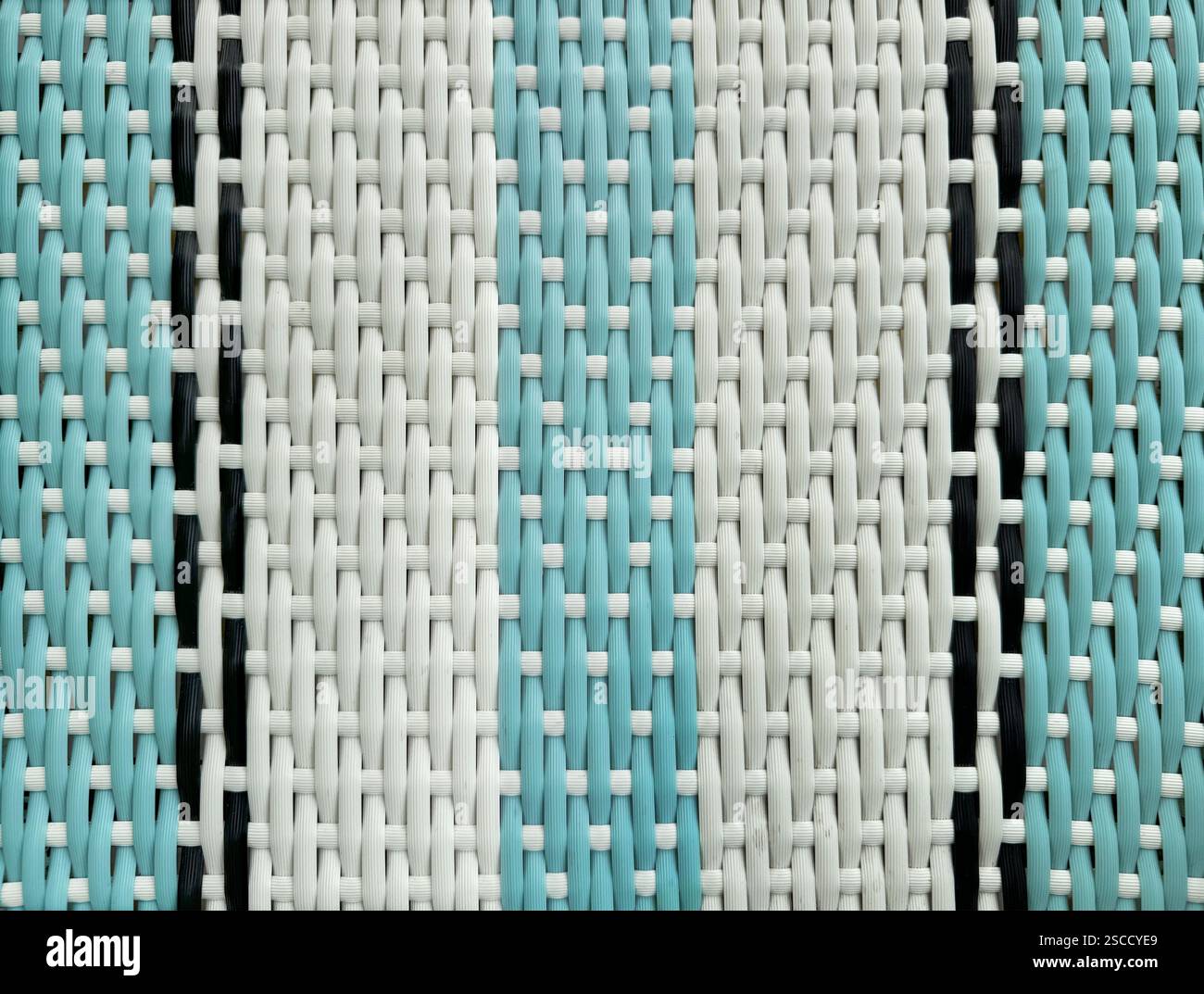 Close up of blue and white synthetic rattan or wicker weaving art in ...