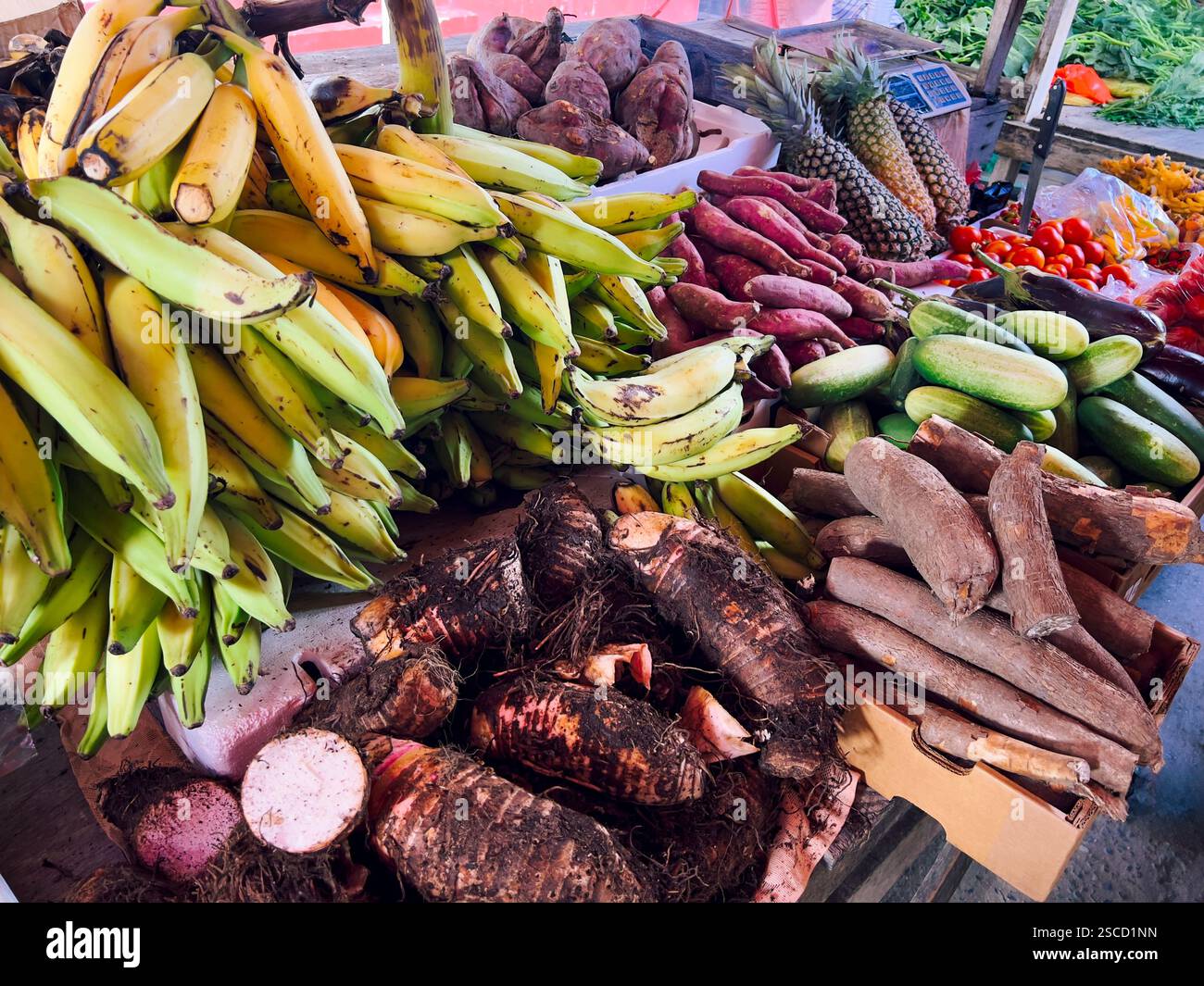 Vegetable stand at farmers market in Guyana featuring root vegetables ...