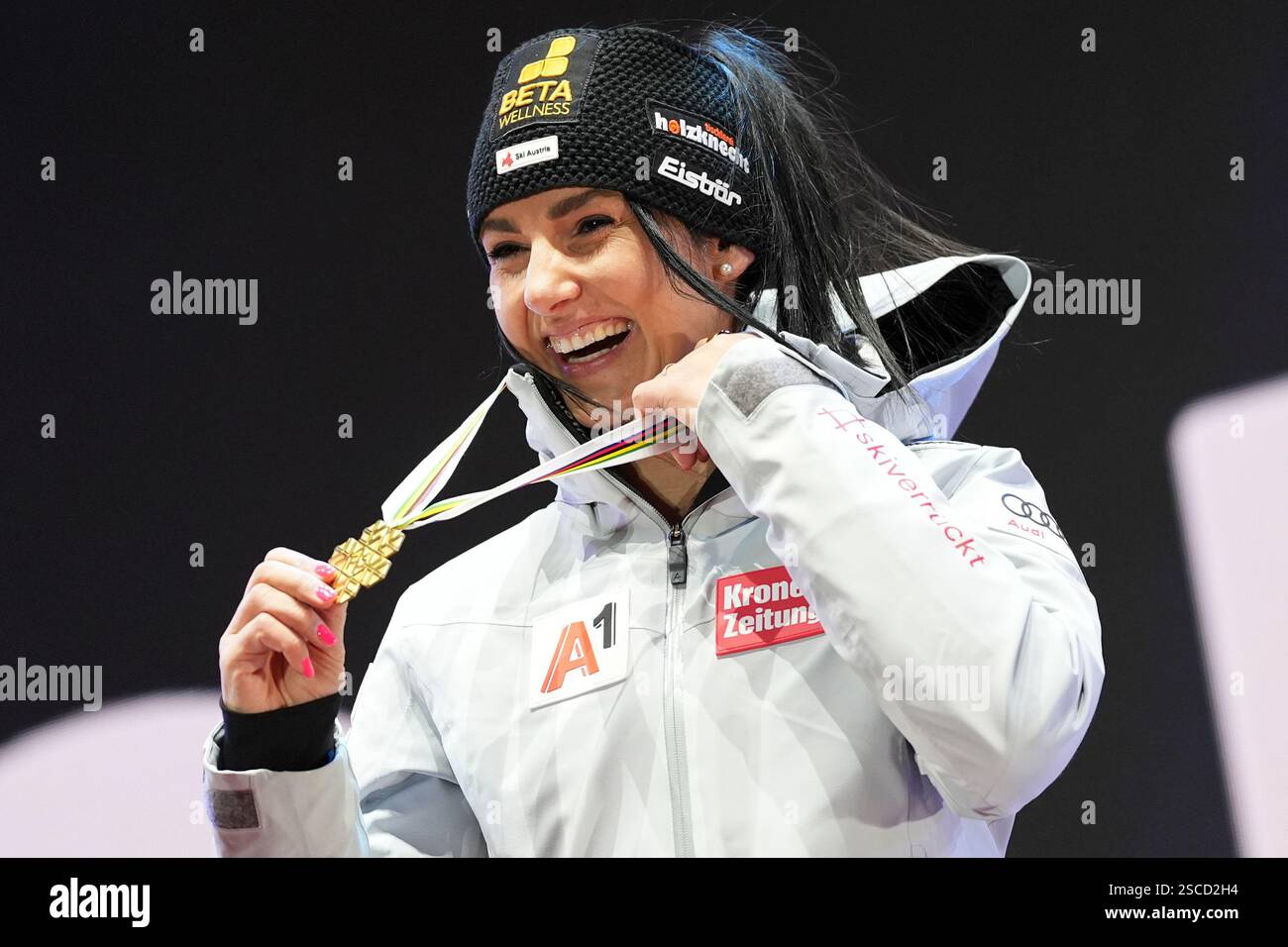 Austria's Stephanie Venier wears the gold medal for a women's Super-G ...