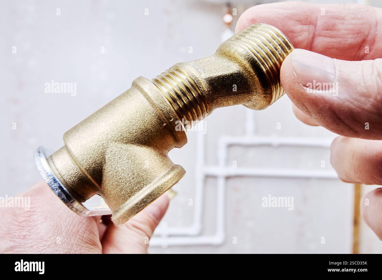 Close-up of threaded brass connector, was named dog legs reducer, used ...