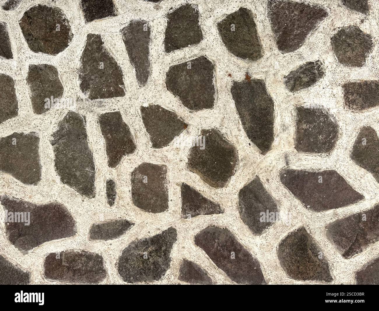 Natural flagstone or flattened flag stones, a series of cobble stone ...