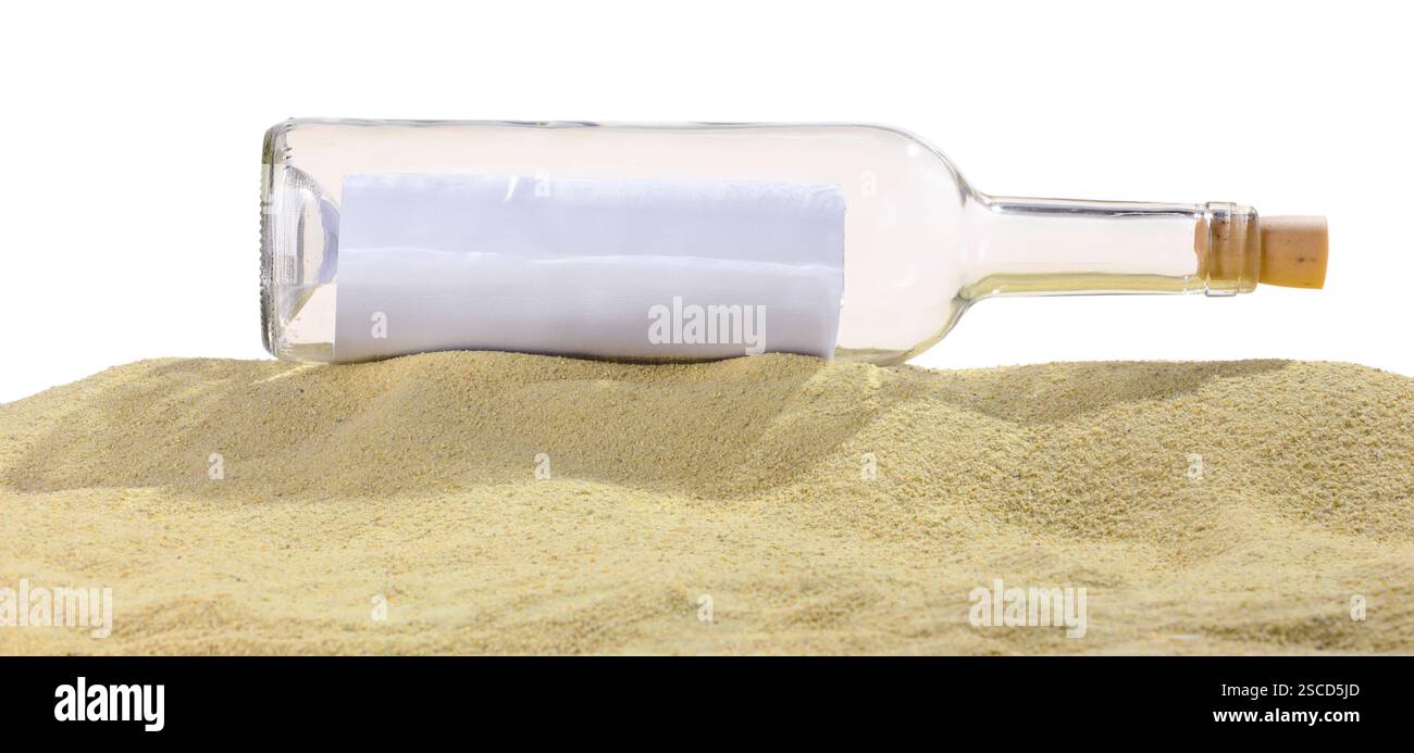 Rolled letter in corked glass bottle on sand against white background ...