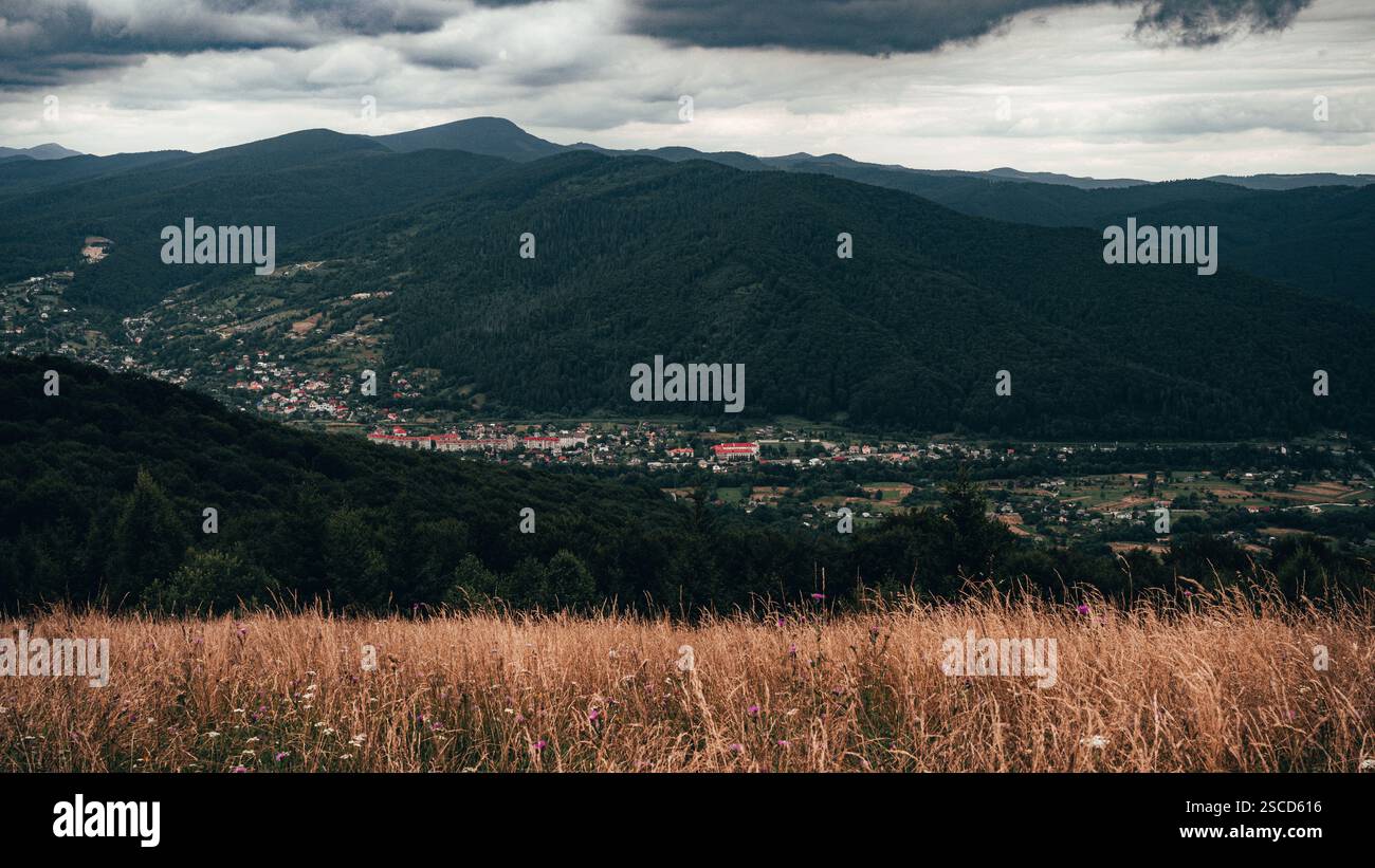 The sweeping view of the mountains stretches across the horizon Stock ...