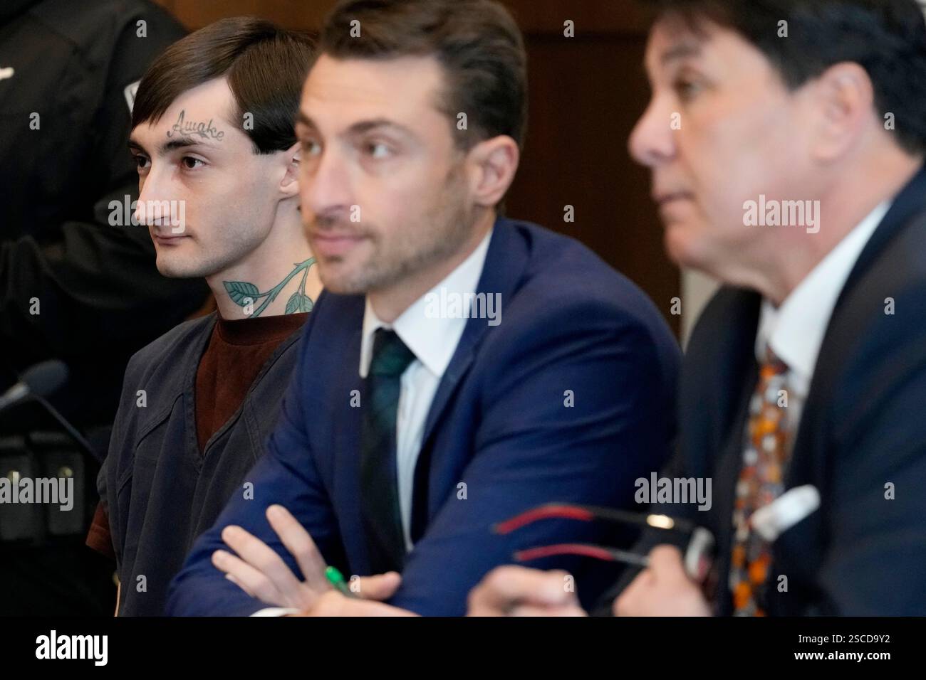 Robert E. Crimo III., left, listens to Judge Victoria A. Rossetti ...
