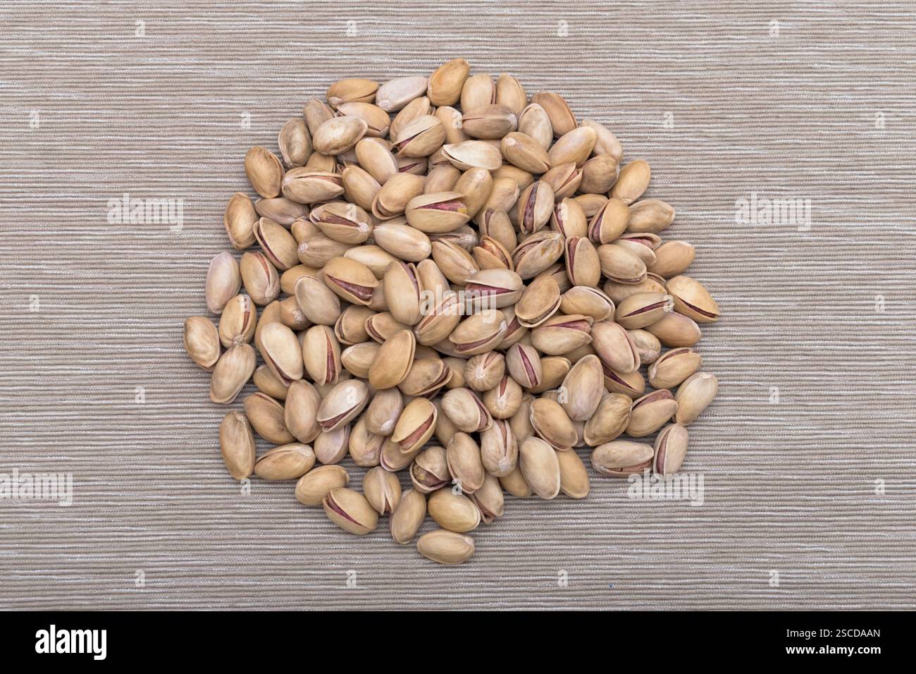 Roasted pistachio nuts in shells. Natural food peanuts stacked background Stock Photo - Alamy