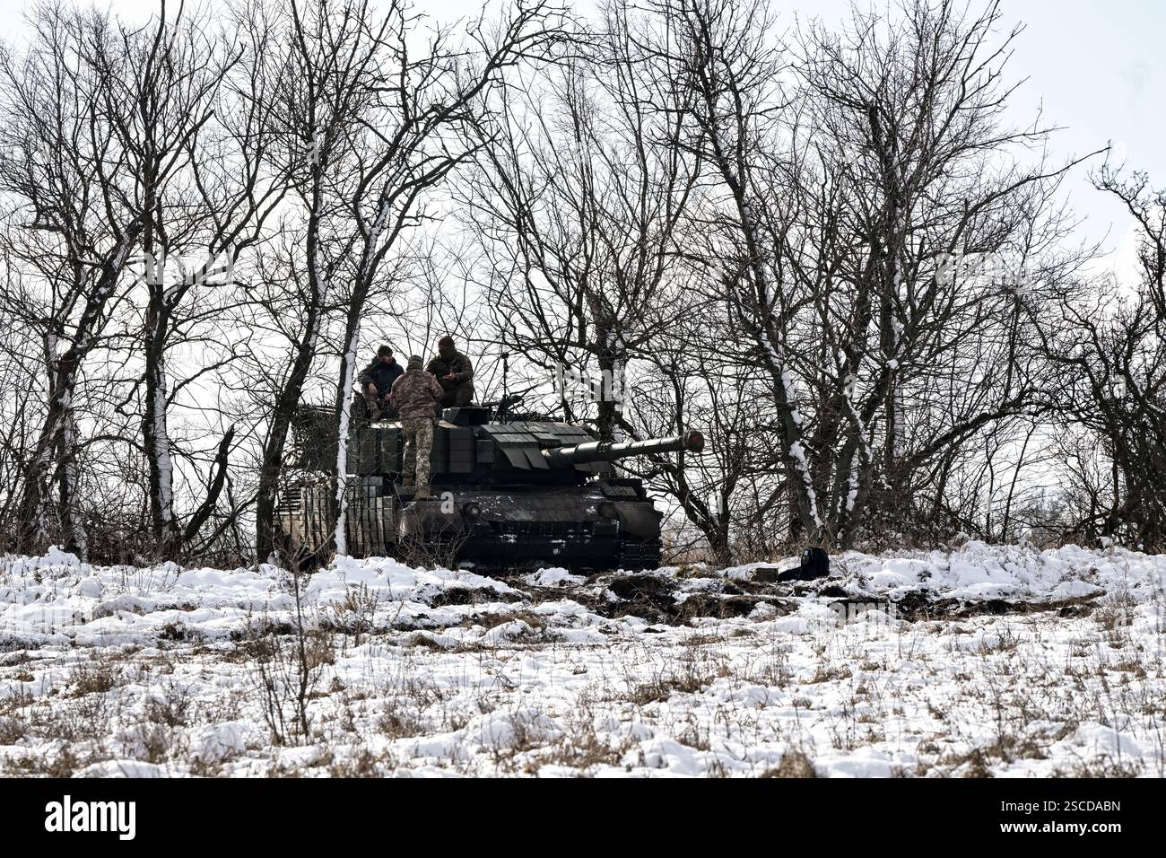 UKRAINE - FEBRUARY 5, 2025 - Soldiers are on top of the tank during a ...