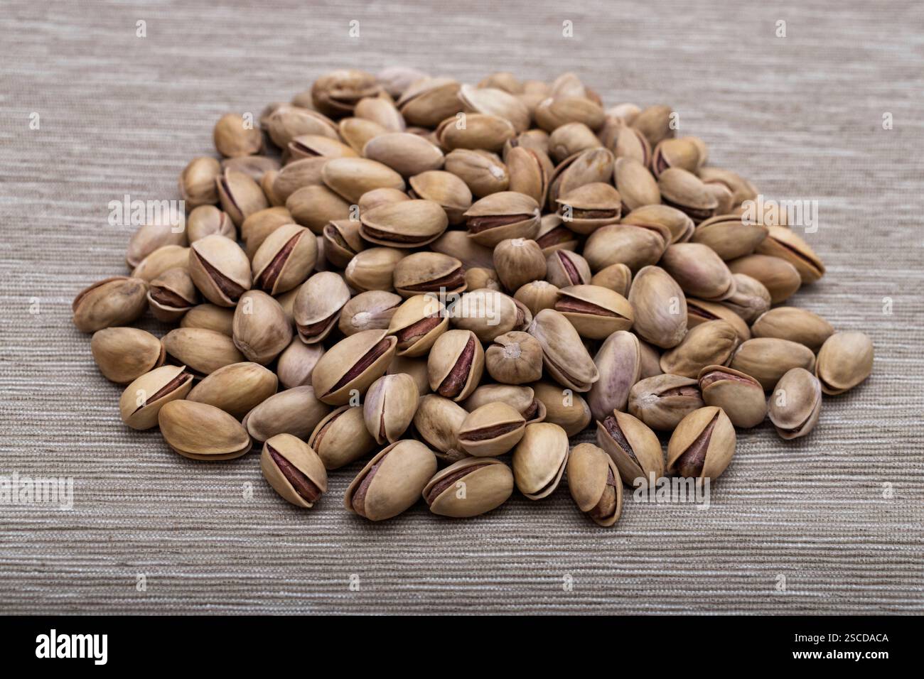 Roasted pistachio nuts in shells. Natural food peanuts stacked background Stock Photo - Alamy