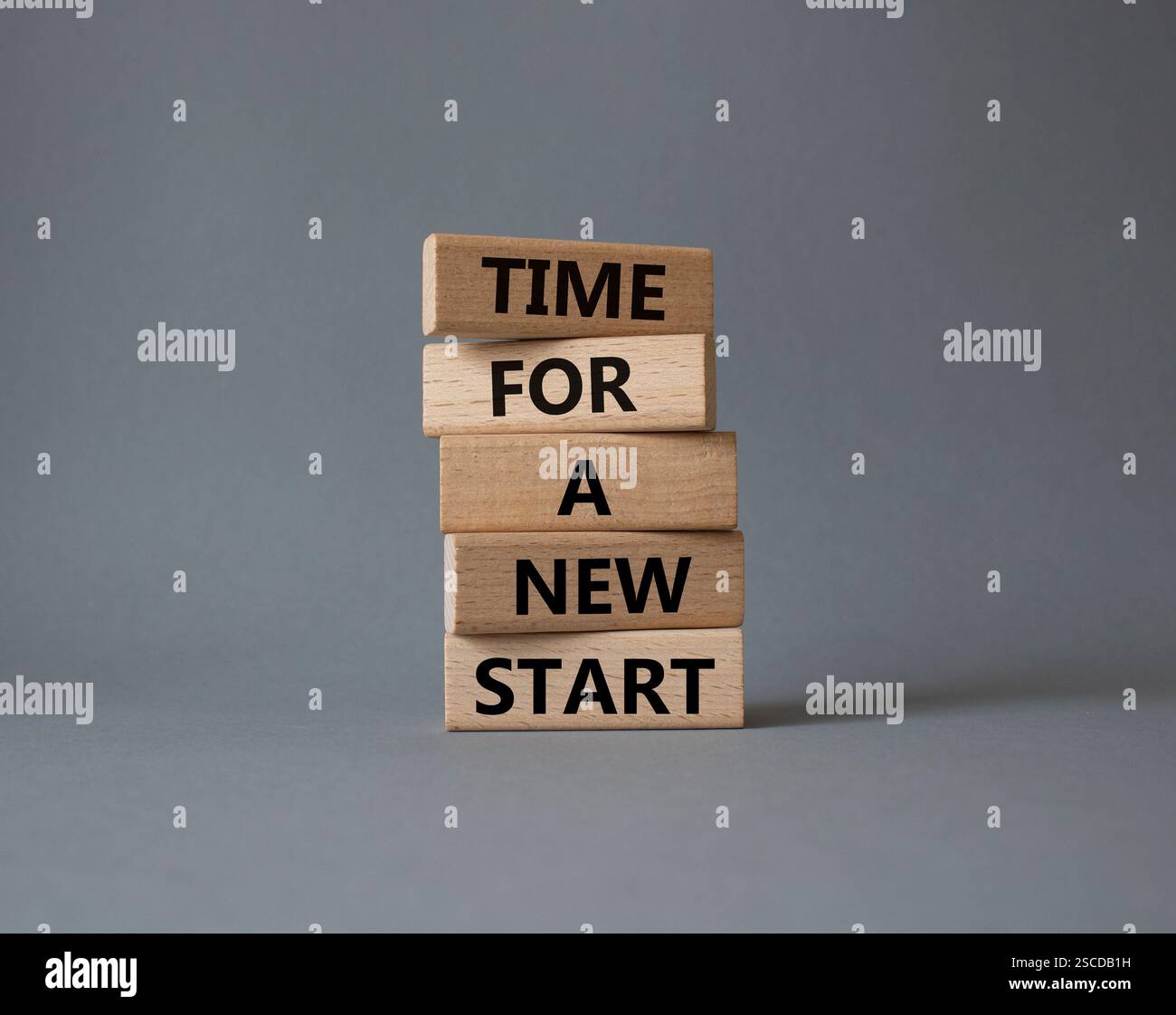 Time for a new start symbol. Wooden blocks with words Time for a new ...