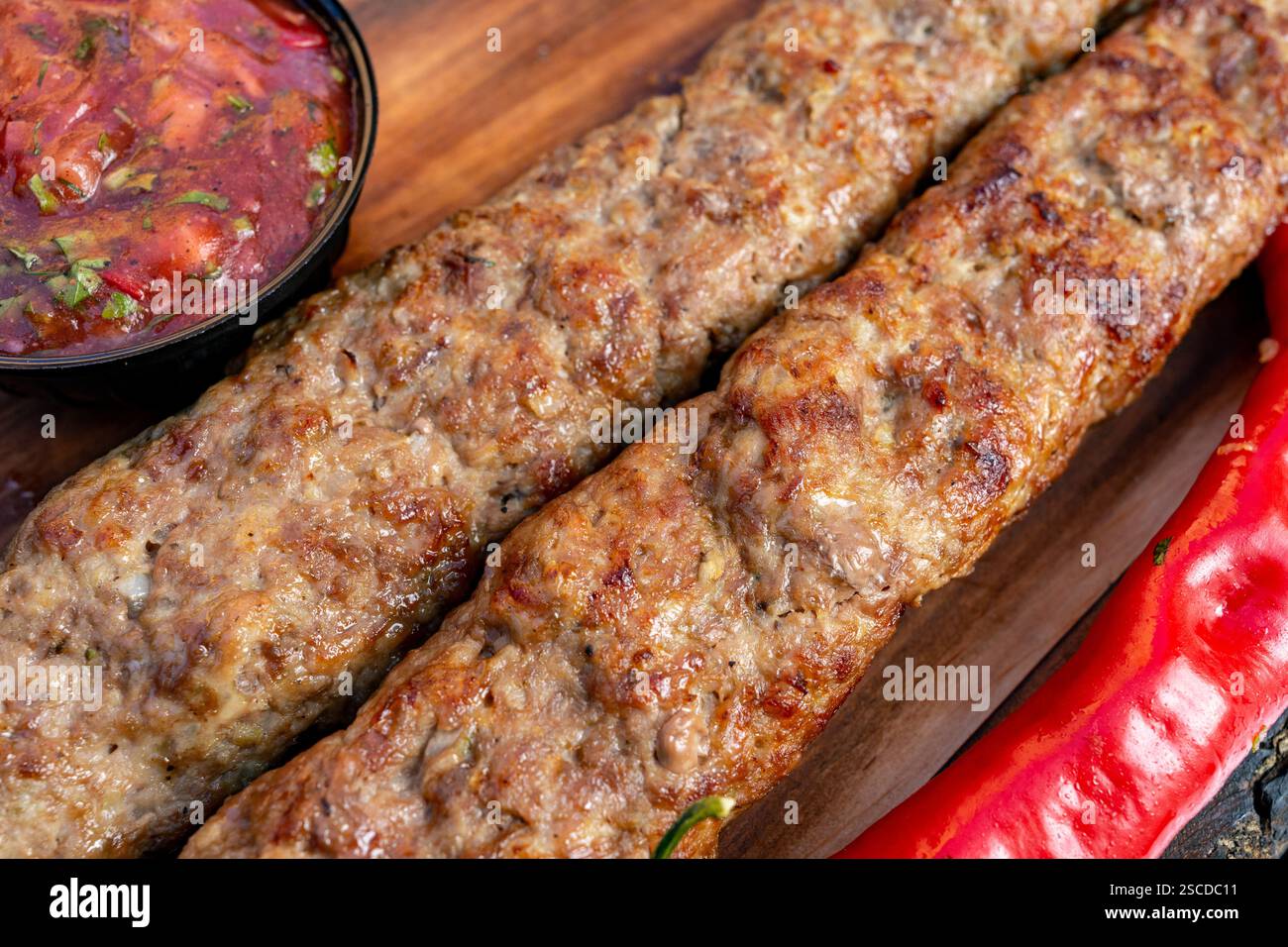 Two juicy grilled skewers hi-res stock photography and images - Alamy