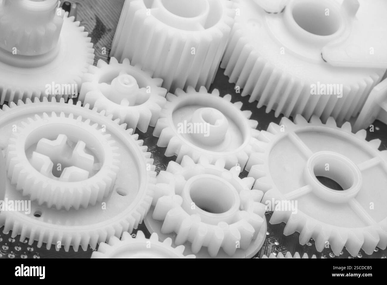 The plastic gear. Photo fragment of machine Stock Photo - Alamy