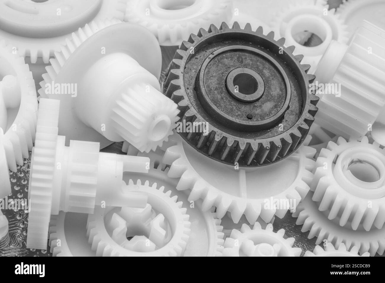 The plastic gear. Photo fragment of machine Stock Photo - Alamy