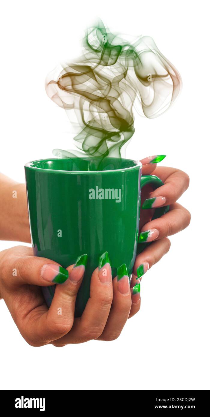Witch's potion in a green cup in the hands of the sorceress Stock Photo ...