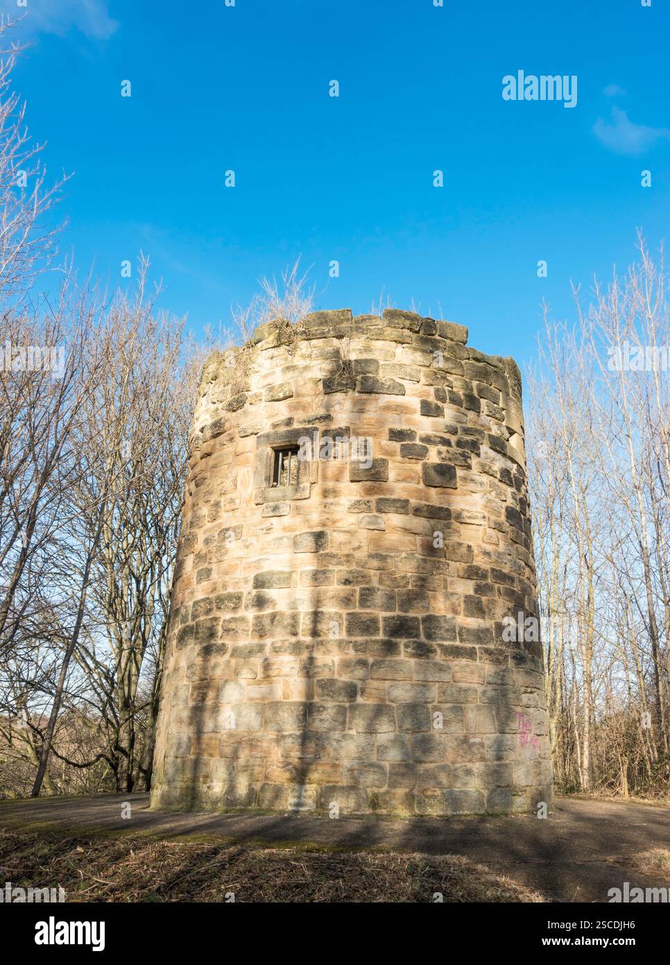 The tower of an 18th century windmill, Heaton Mill, in Armstrong Park ...