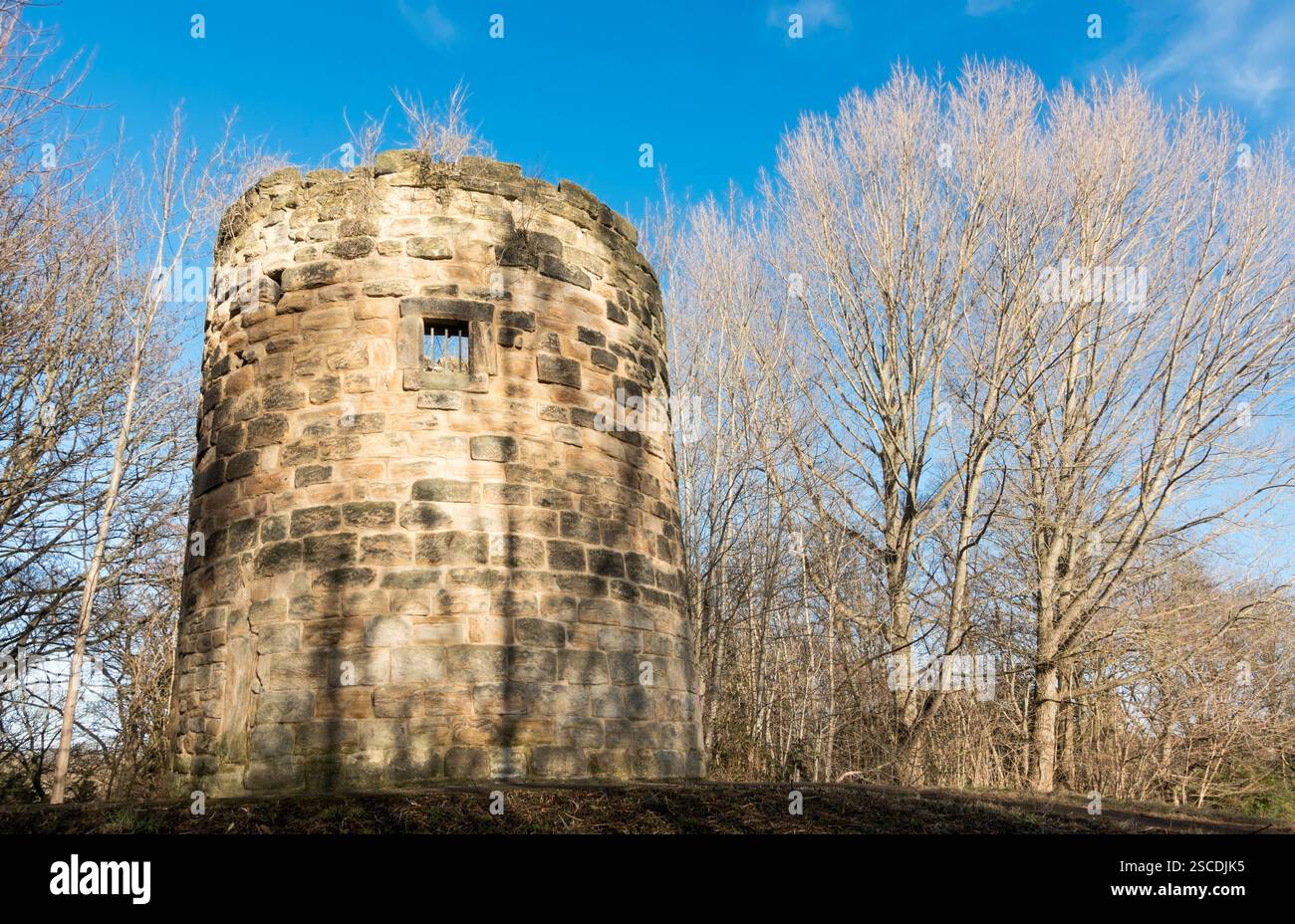 The tower of an 18th century windmill, Heaton Mill, in Armstrong Park ...