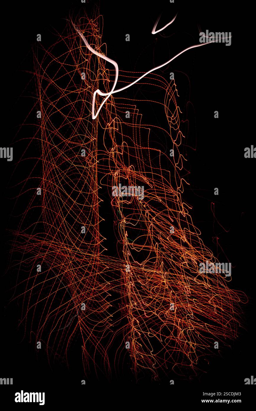 Abstract color red orange crooked lines on dark black background Stock ...