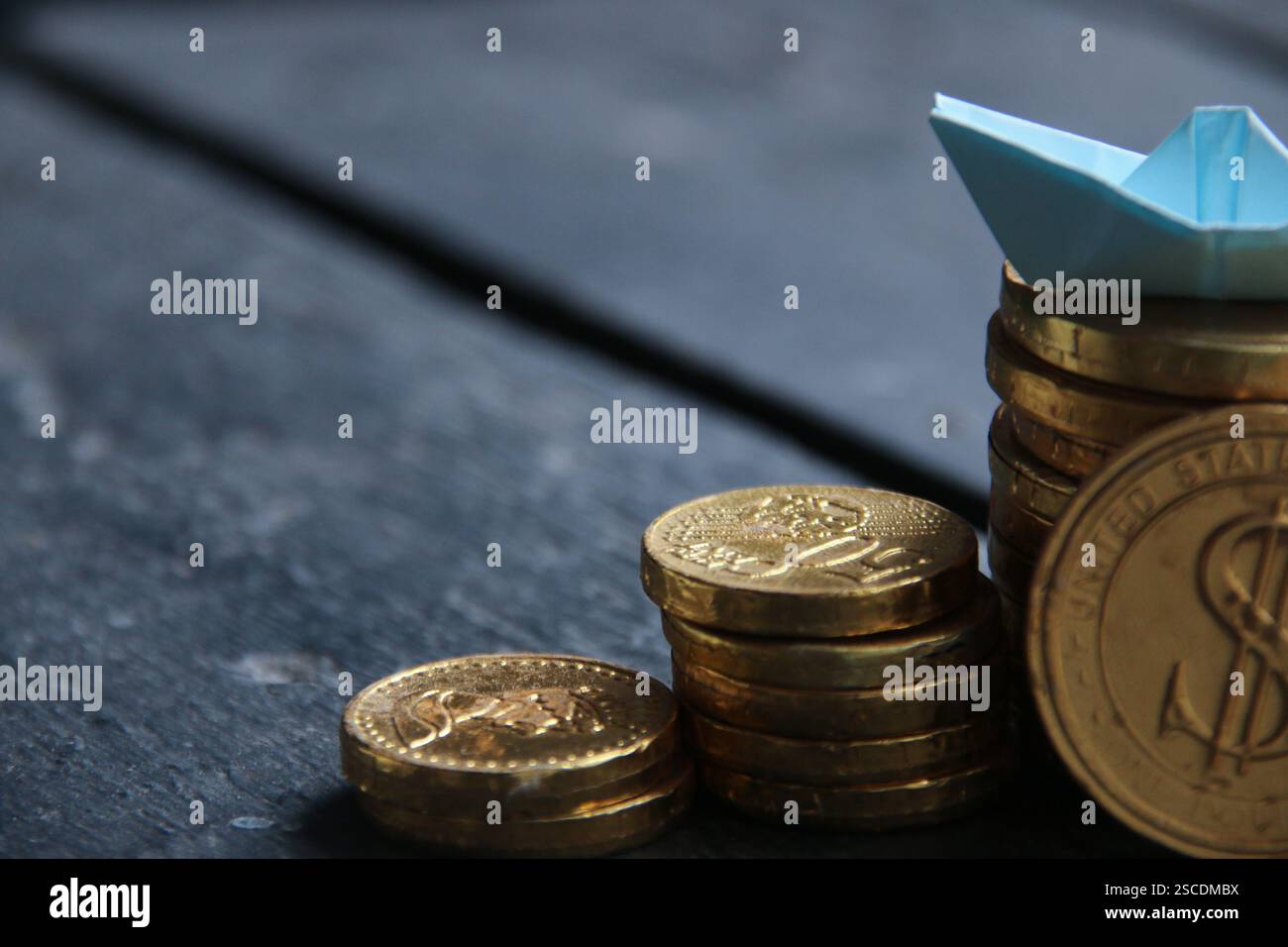 Golden coins raising chart vintage background Stock Photo - Alamy
