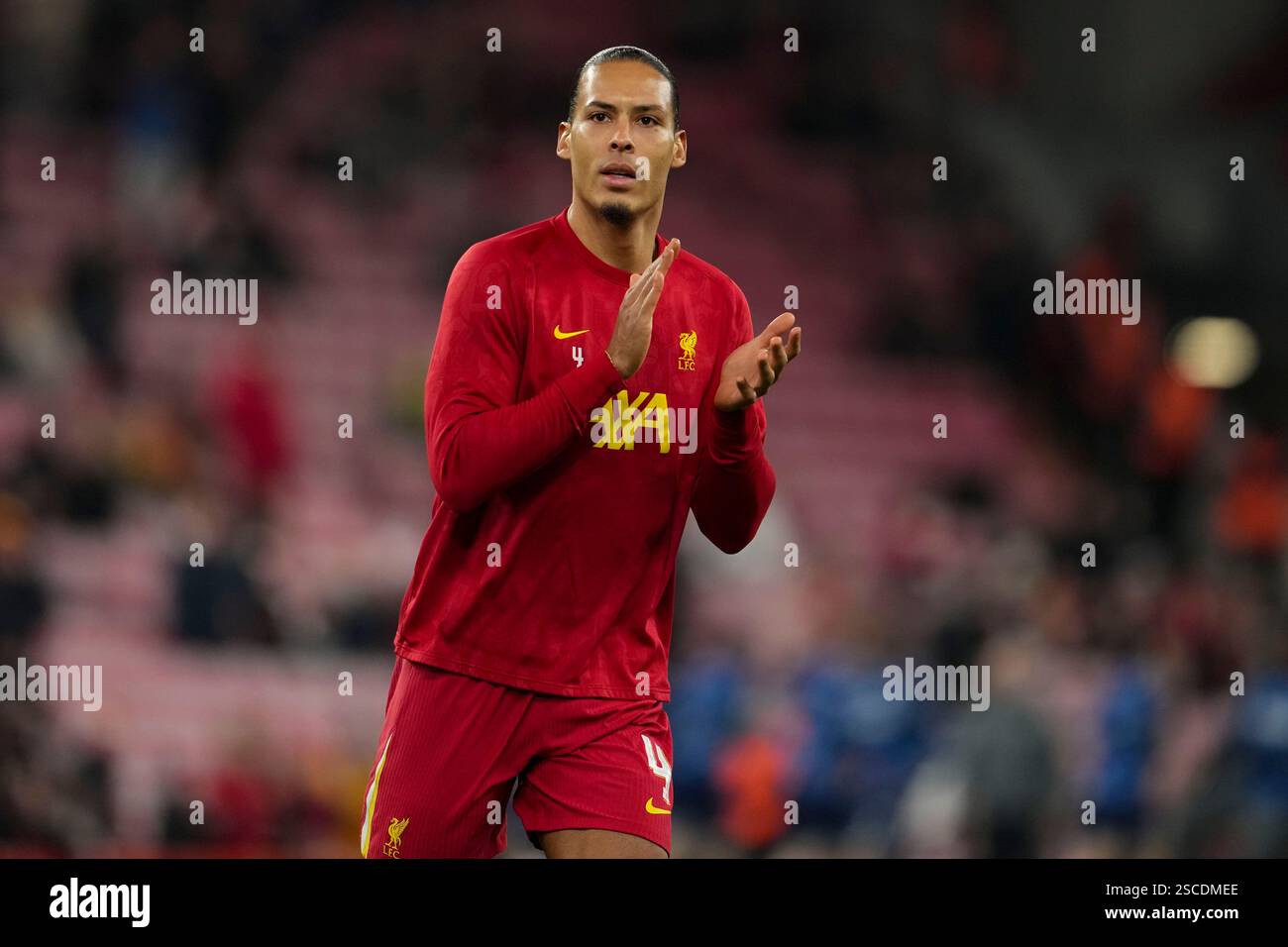 Liverpool's Virgil van Dijk applauds as he warms-up before the English ...