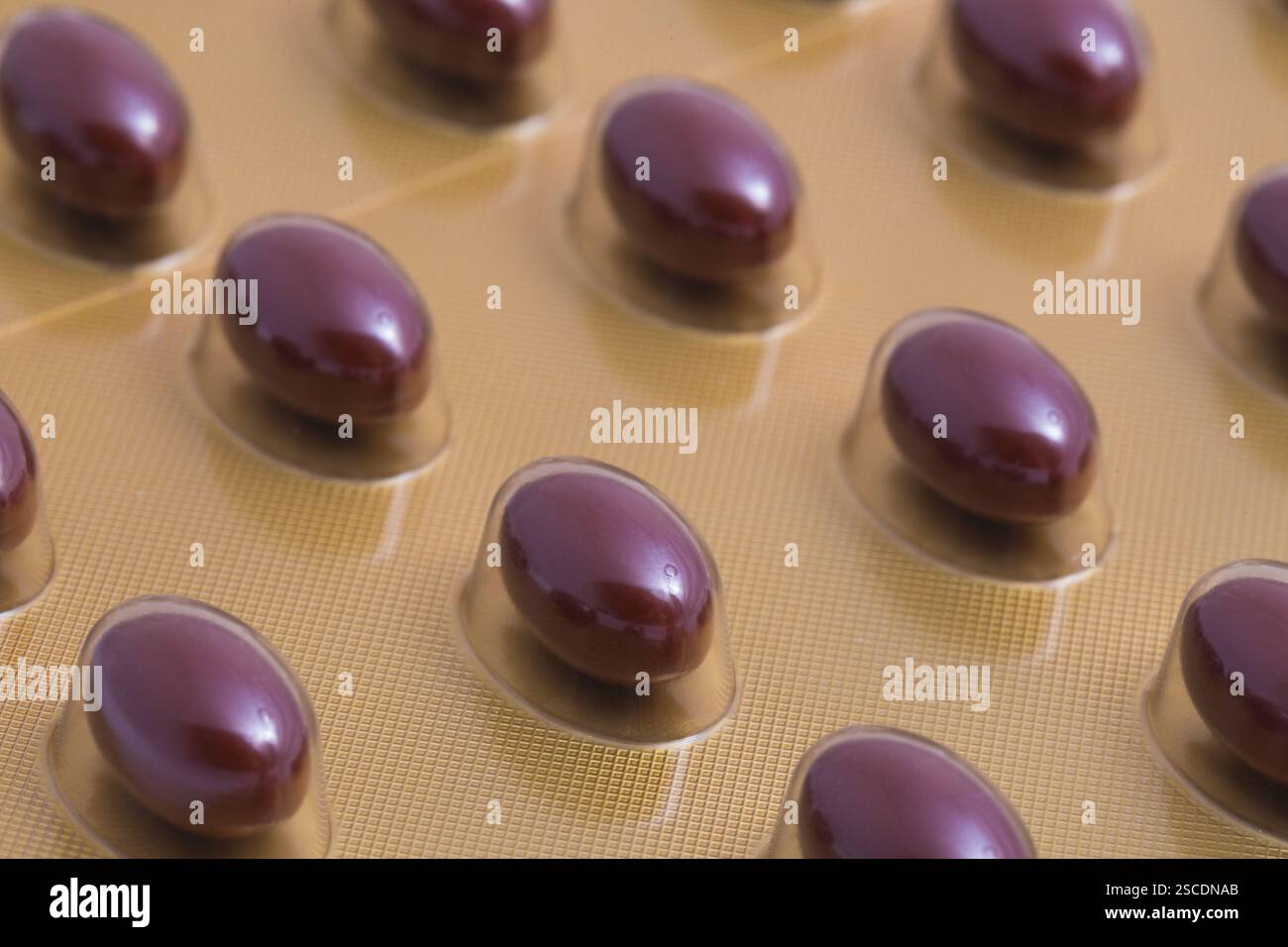 the color pill or just salmon oil capsules Stock Photo - Alamy