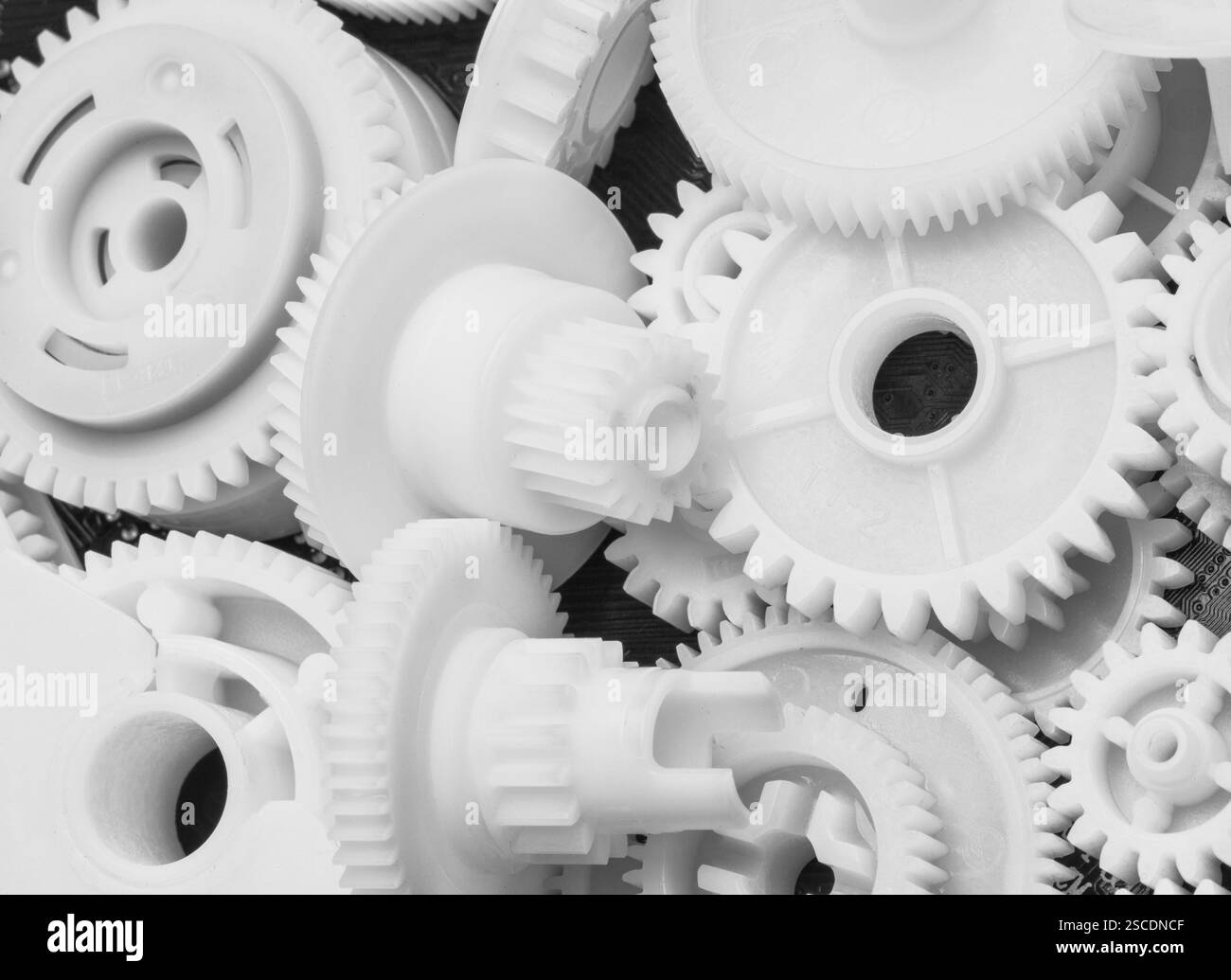The plastic gear. Photo fragment of machine Stock Photo - Alamy