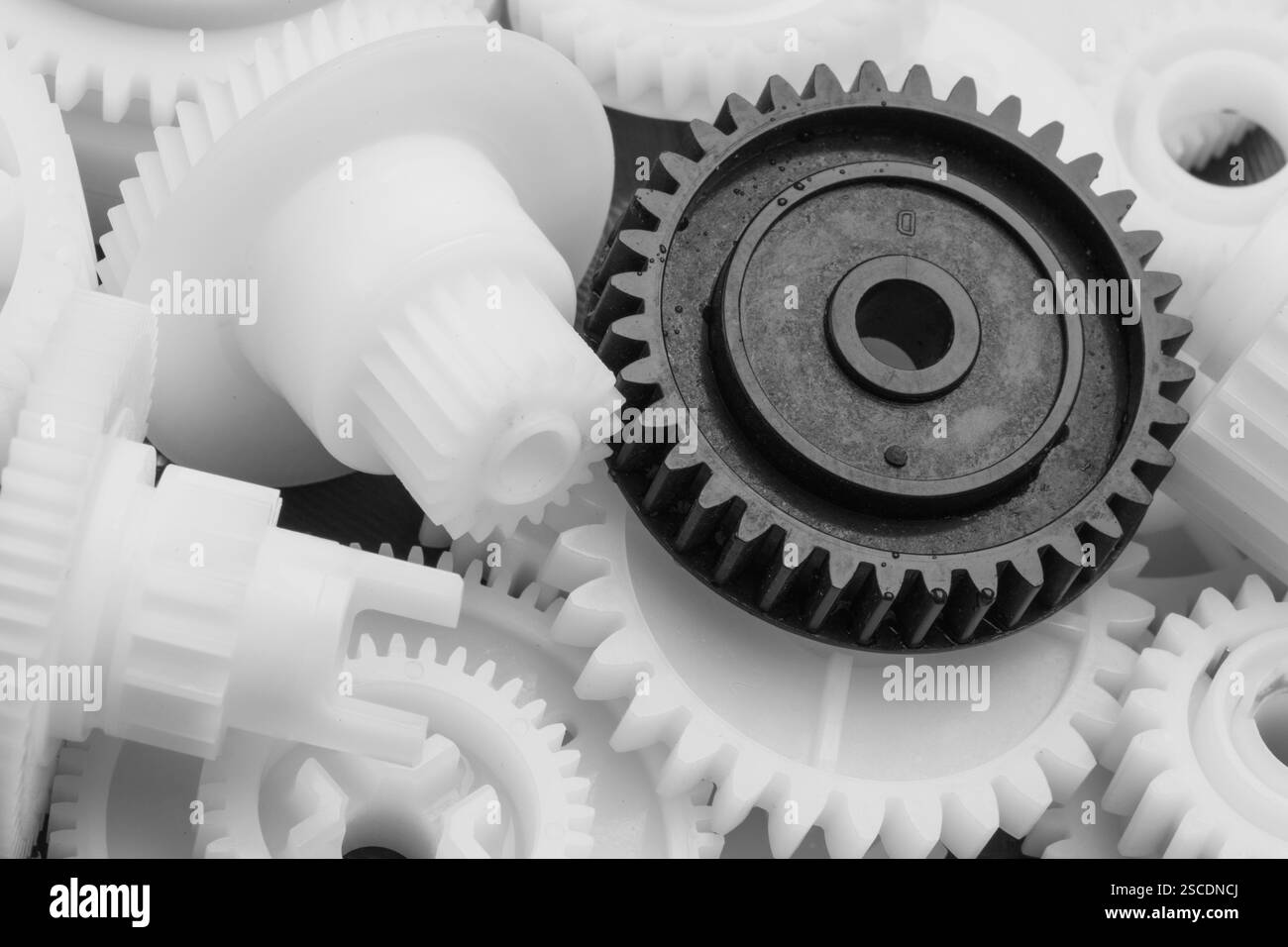 The plastic gear. Photo fragment of machine Stock Photo - Alamy