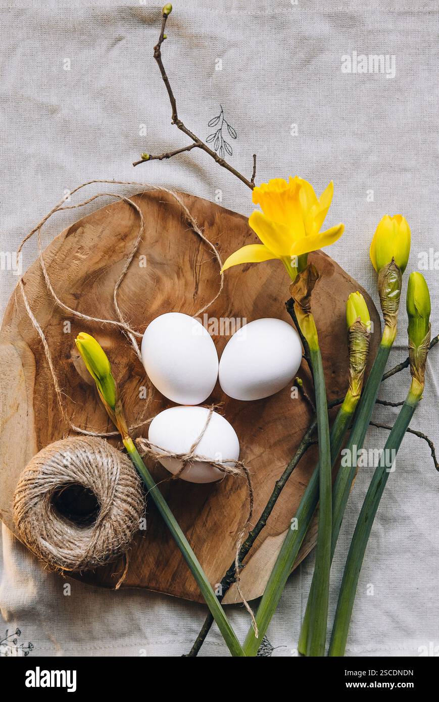 Spring Easter background with daffodils in a bucket on the window ...