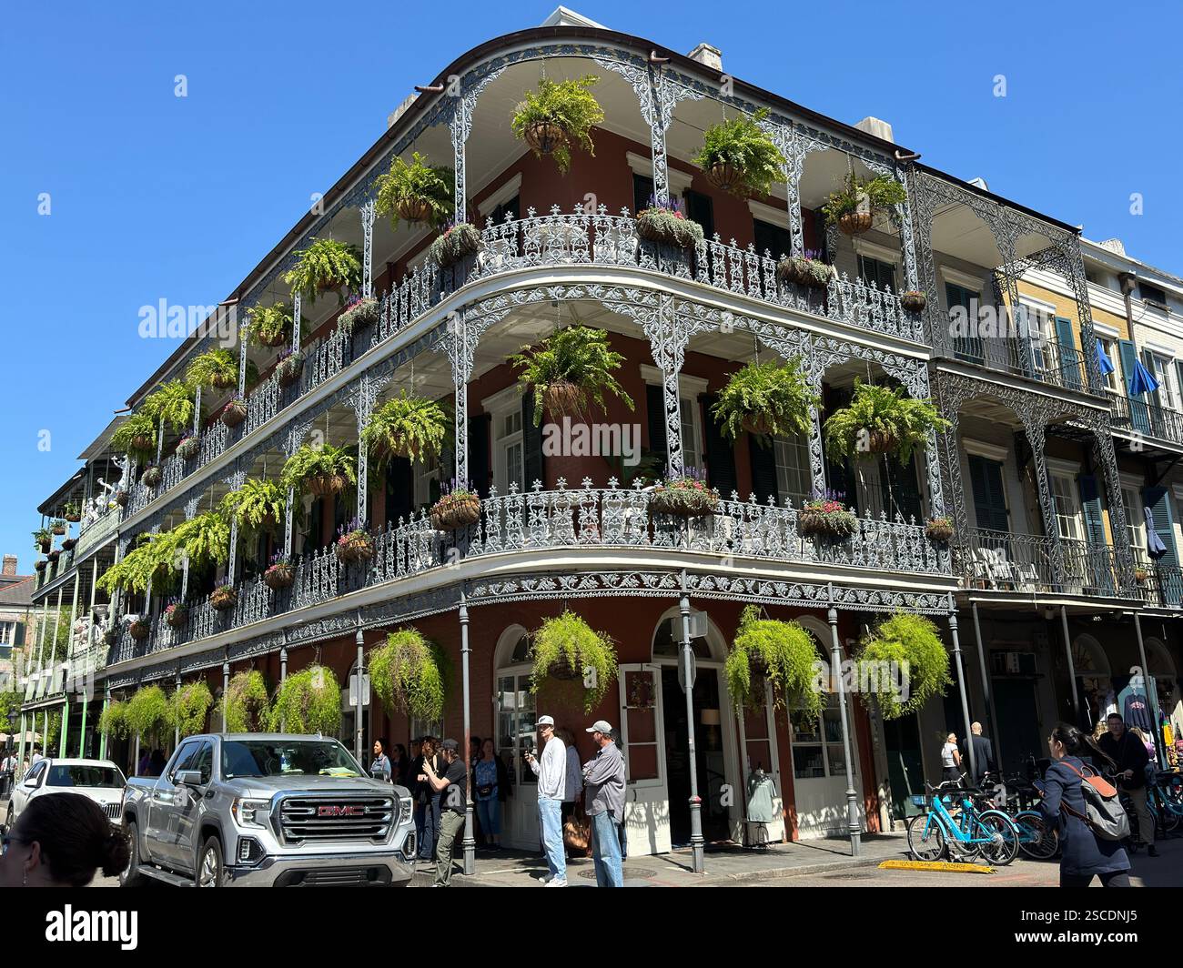 An iconic corner building in New Orleans featuring elaborate wrought ...