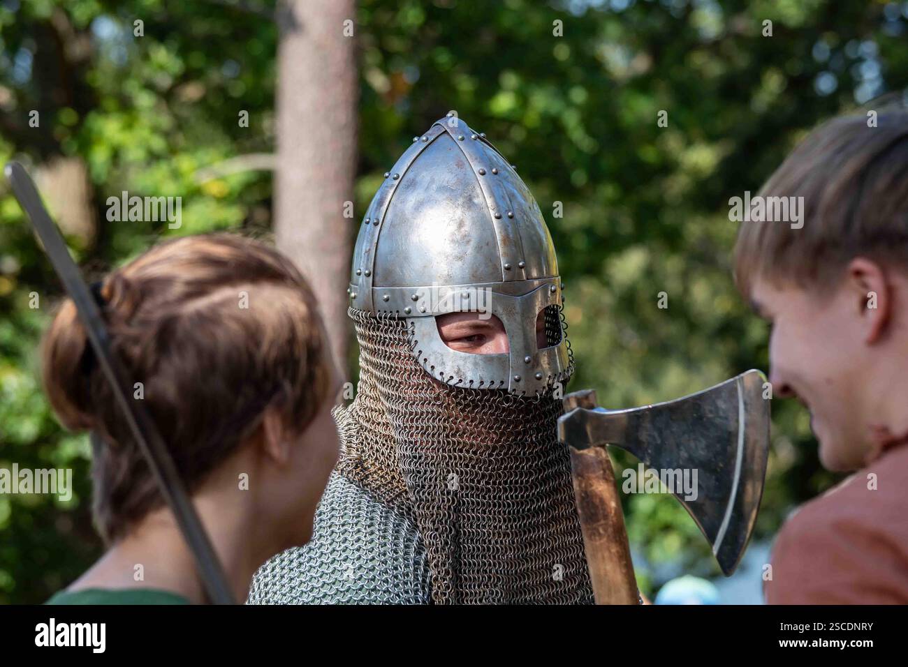 Re-enactor wearing bascinet with aventail at Pukkisaari Iron Age Market ...