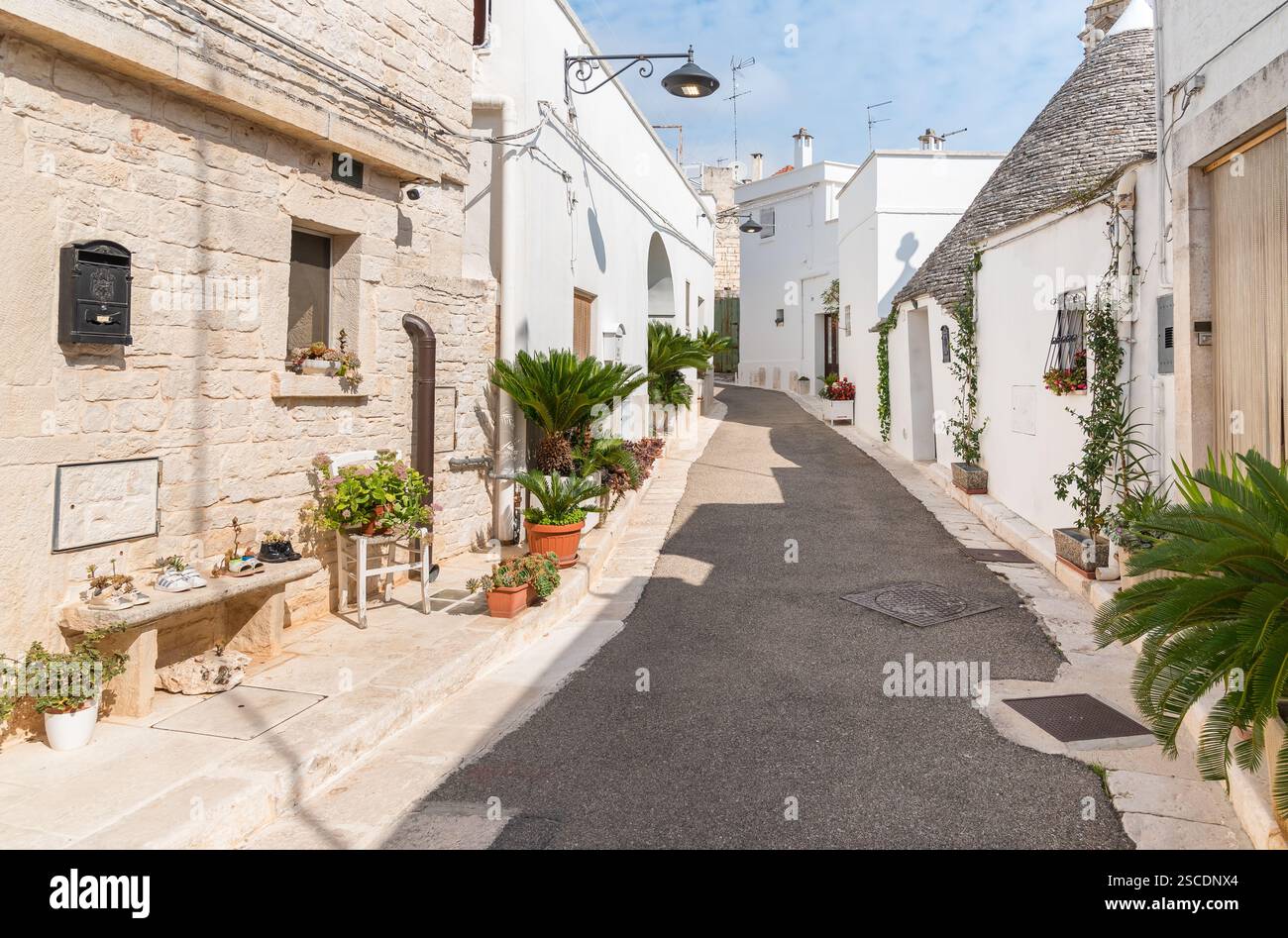 Street in the ancient village of Alberobello, in the province of Bari ...