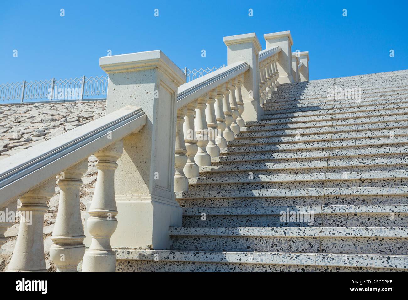 A stone staircase with white balustrade outdoor Stock Photo - Alamy