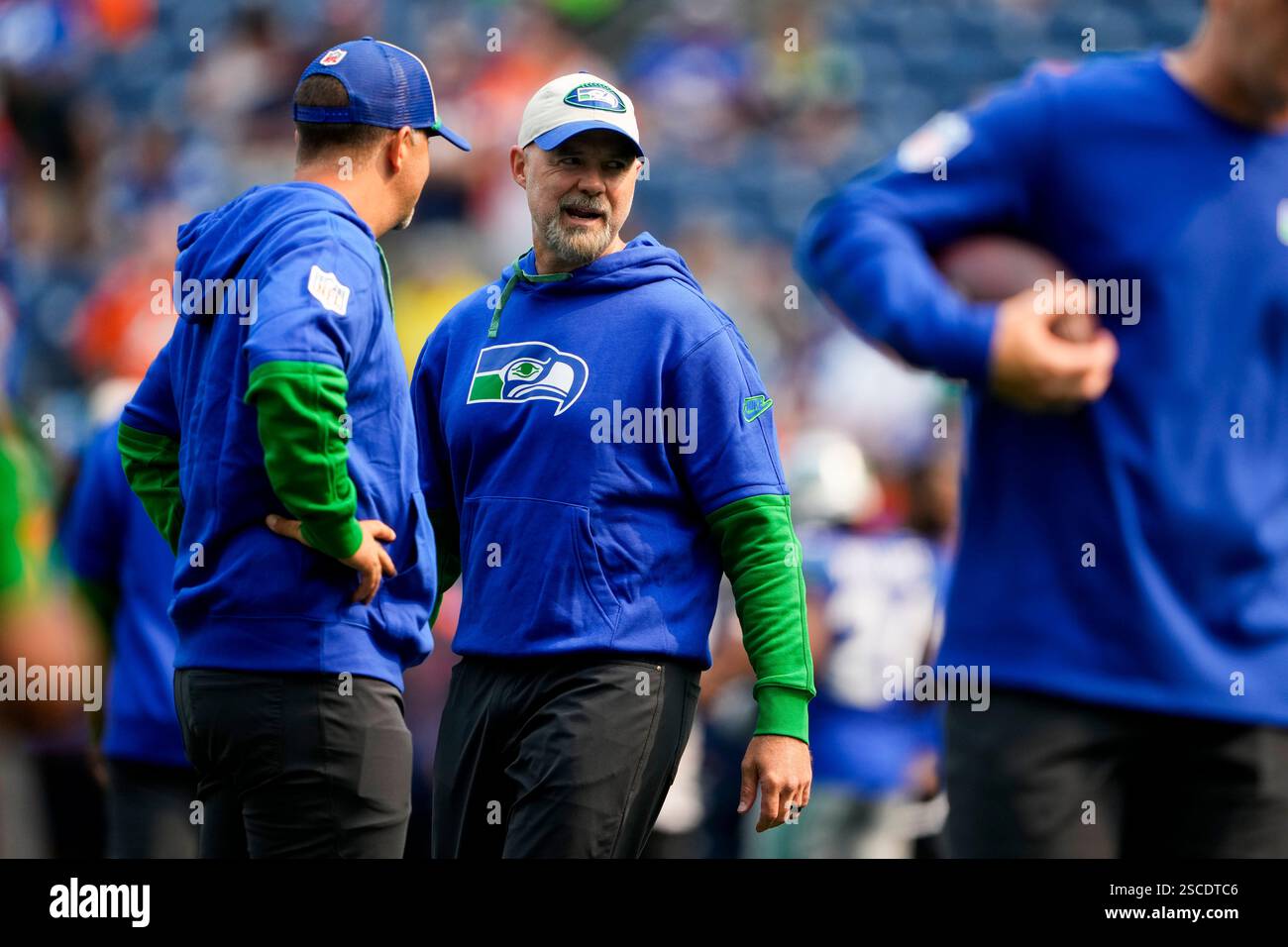 FILE - Seattle Seahawks then-offensive coordinator Ryan Grubb, center ...
