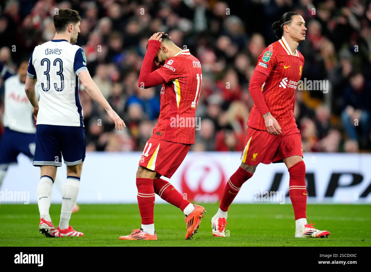 Liverpool's Mohamed Salah (centre) rues a missed chance during the ...